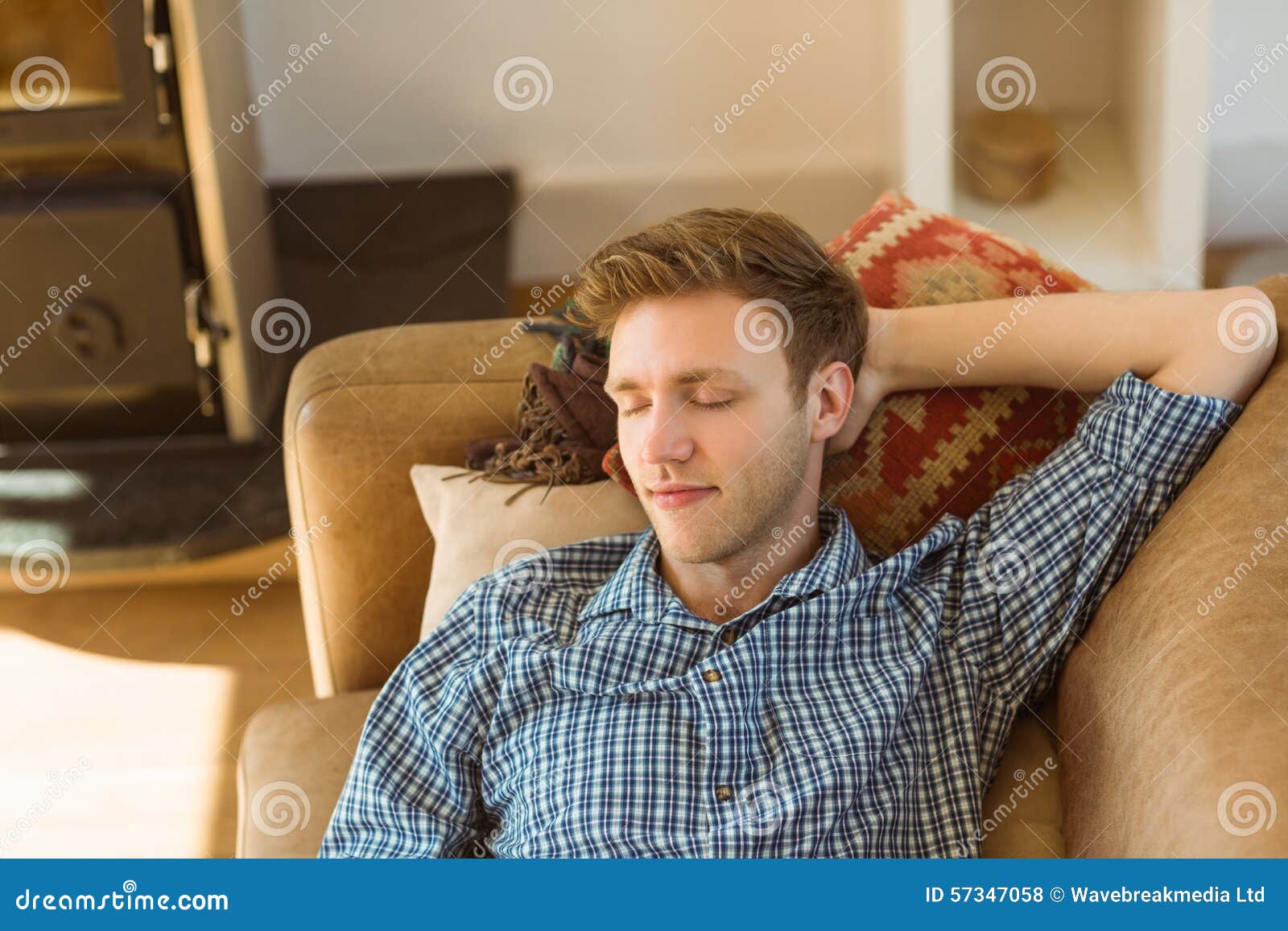 Young Man Napping on His Couch Stock Photo - Image of homey, peaceful ...