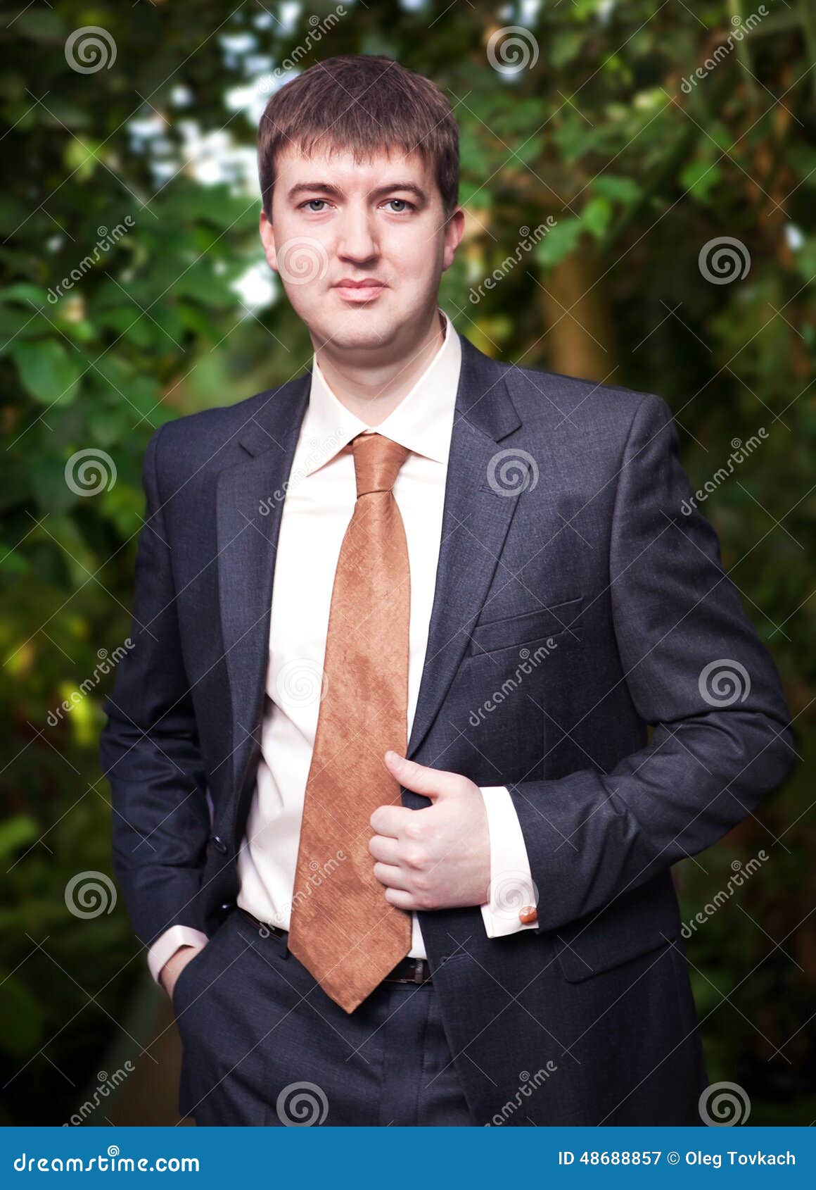 Young man near the tree stock image. Image of flower - 48688857