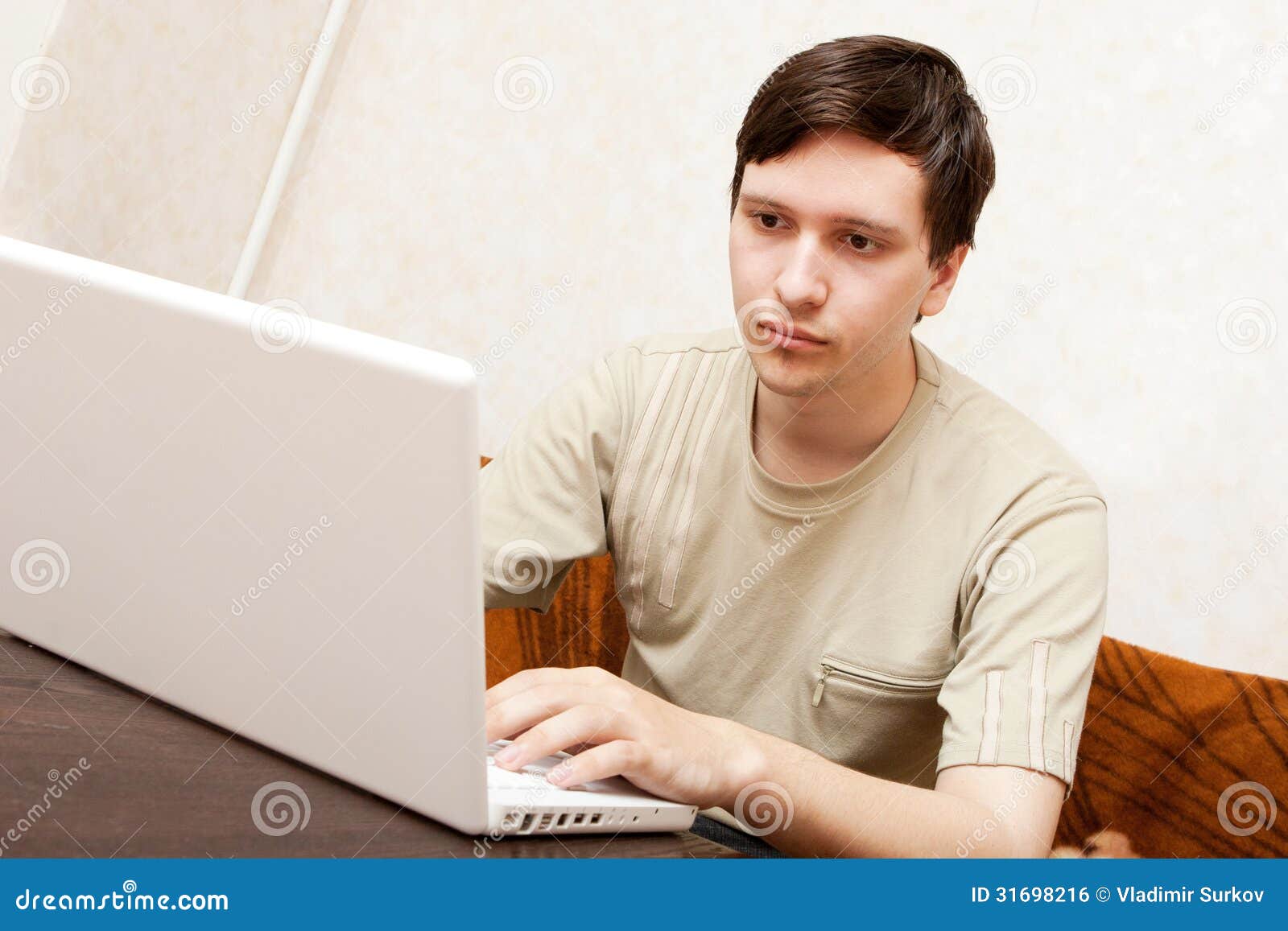 Young man with notebook stock photo. Image of looking - 31698216