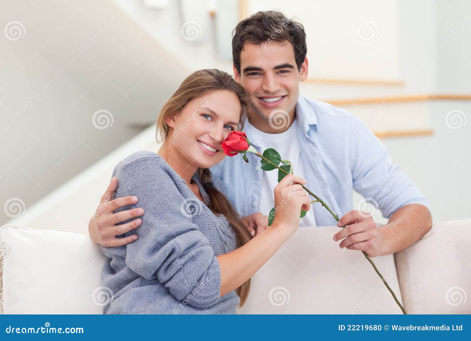 Young Man Offering a Rose To His Girlfriend Stock Photo - Image of ...