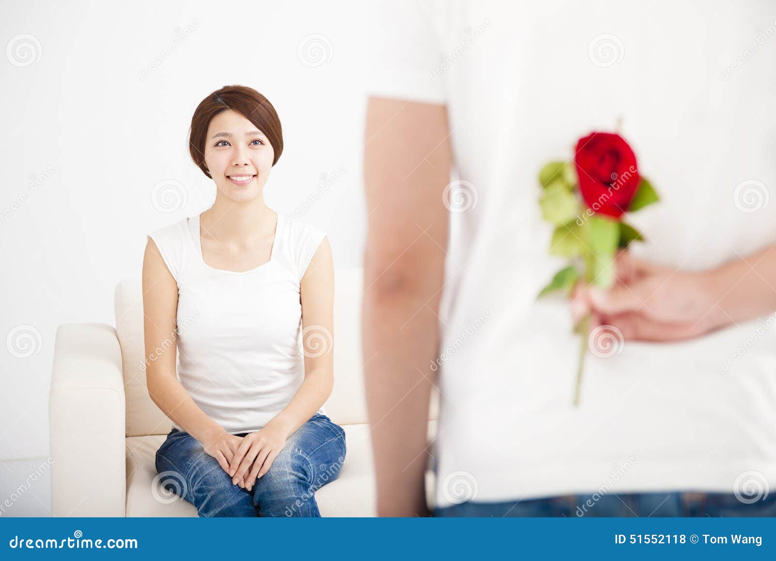 Young Man Offering Rose To His Girlfriend Stock Photo - Image of ...