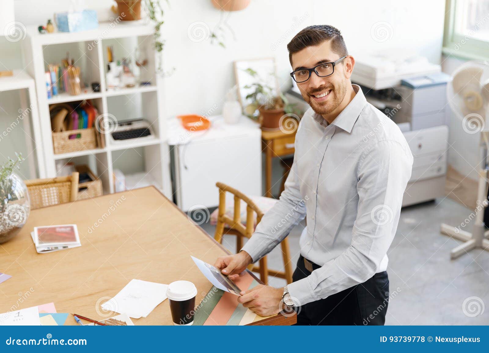 Young man in offfice stock photo. Image of person, cheerful - 93739778
