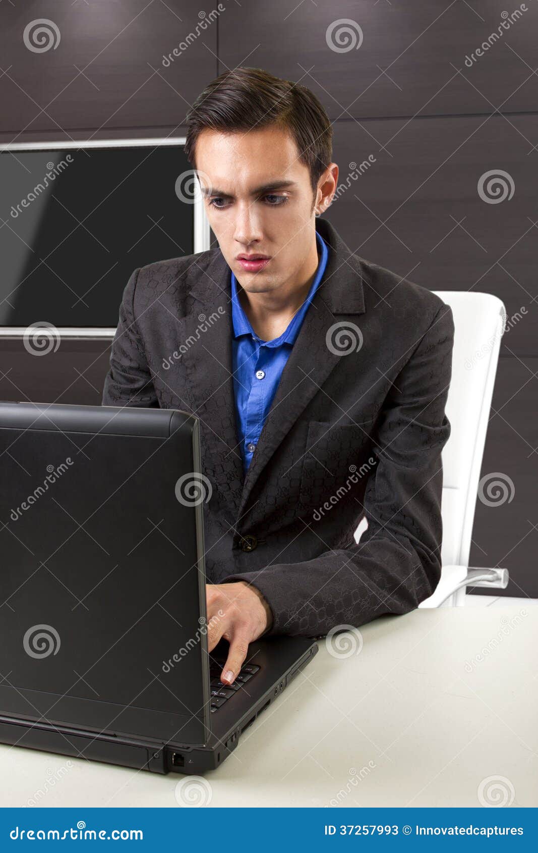 Young Man in the Office stock image. Image of career - 37257993