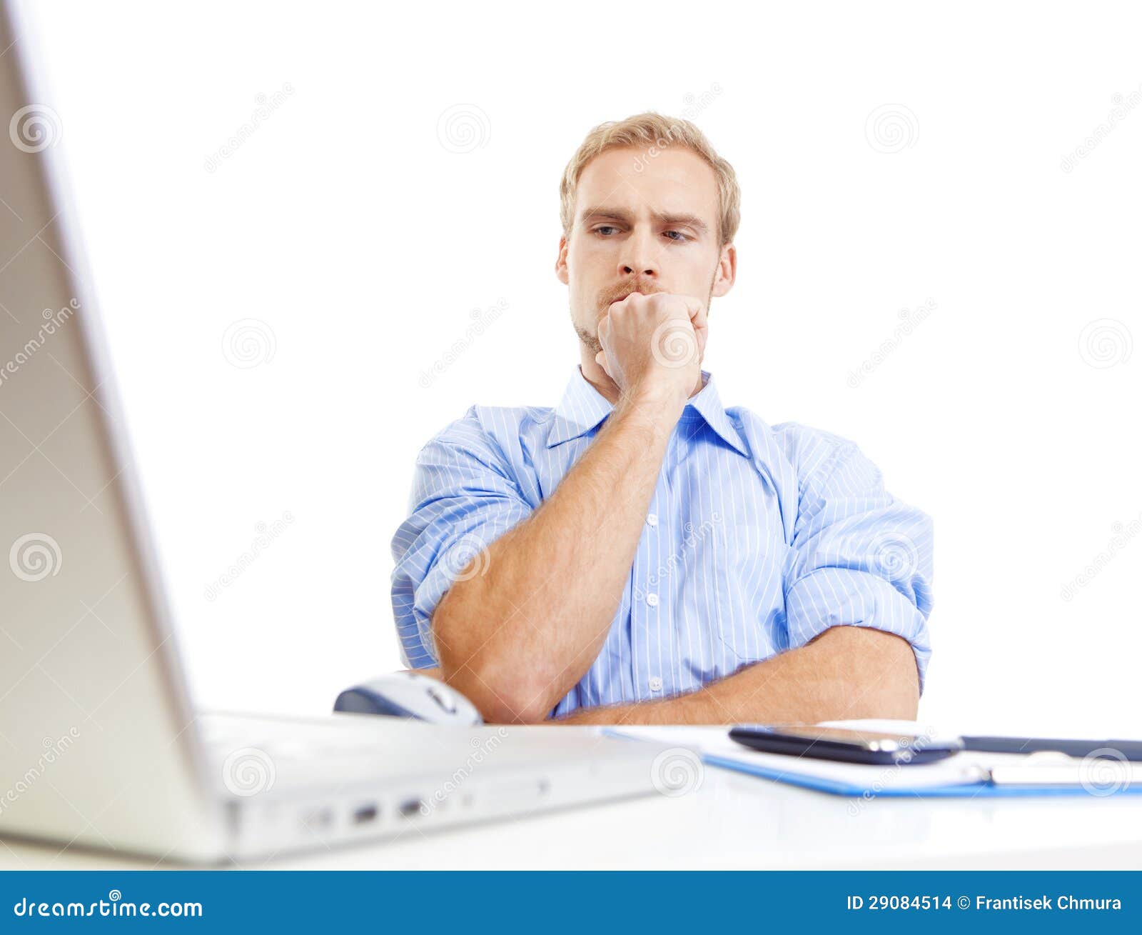 Young Man at Office Thinking Stock Photo - Image of laptop, sitting ...