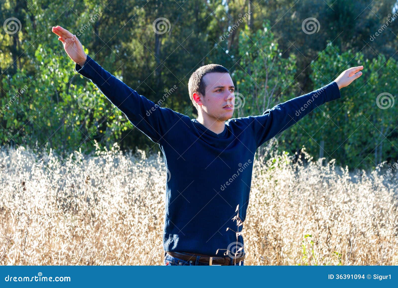 Young Man with Open Arms stock photo. Image of crossed - 36391094