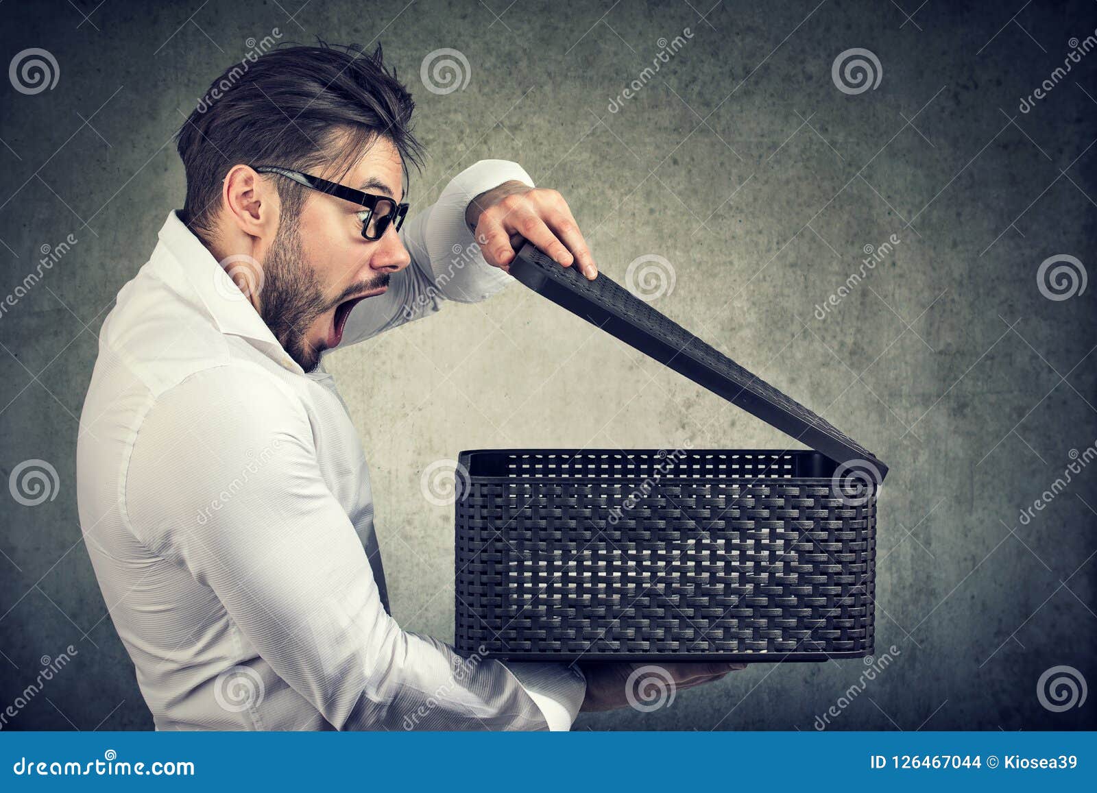 Man Opening a Box with Something Exciting Inside it Stock Photo - Image ...