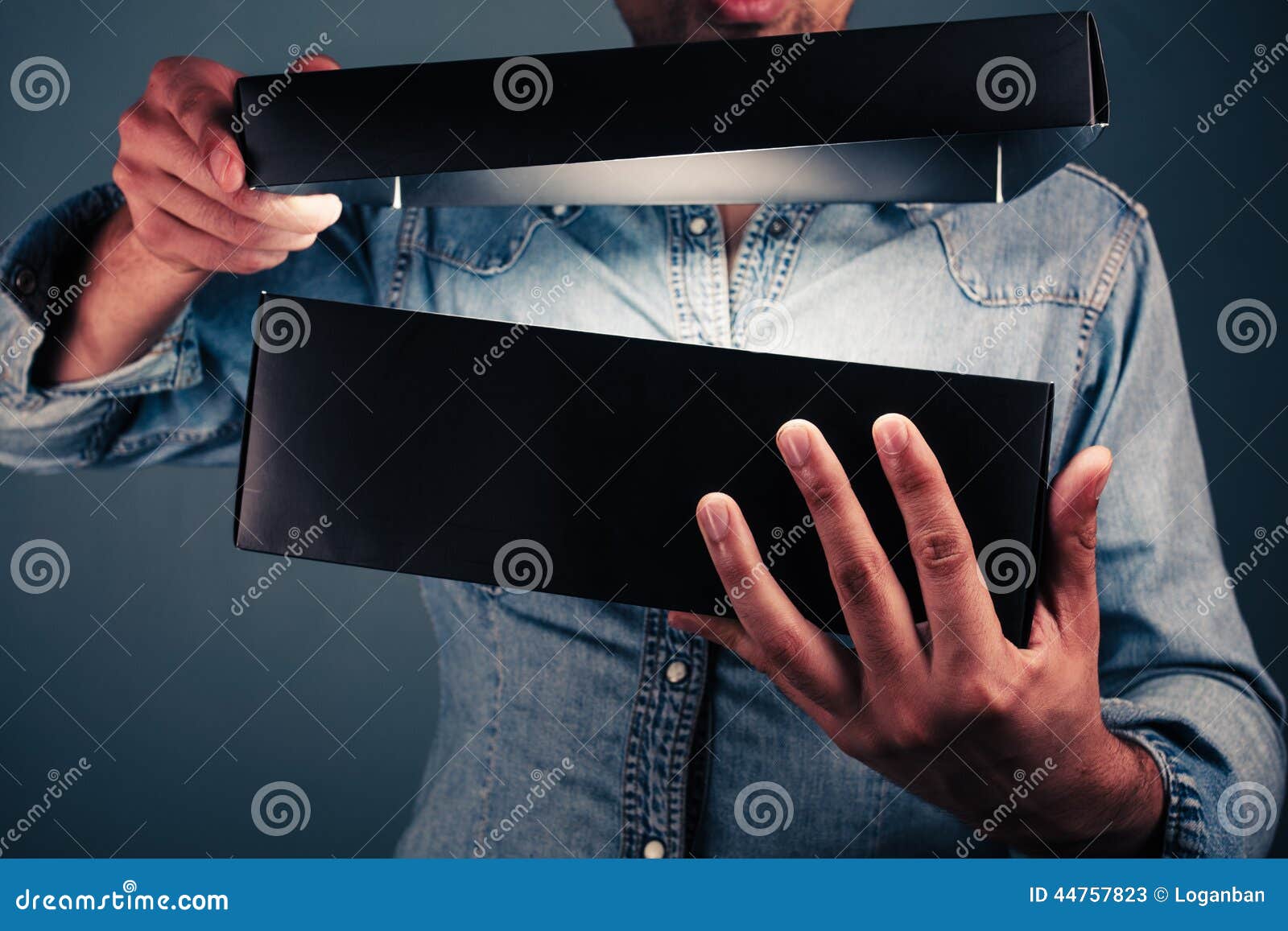 Young Man Opening an Exciting Box Stock Image - Image of gift, inside ...