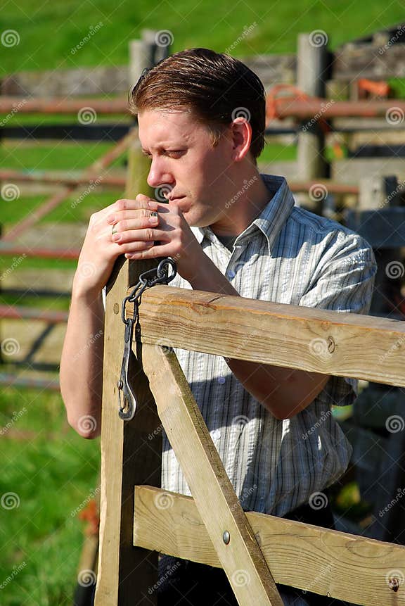 Young man opening a gate stock photo. Image of hand, hands - 9602694