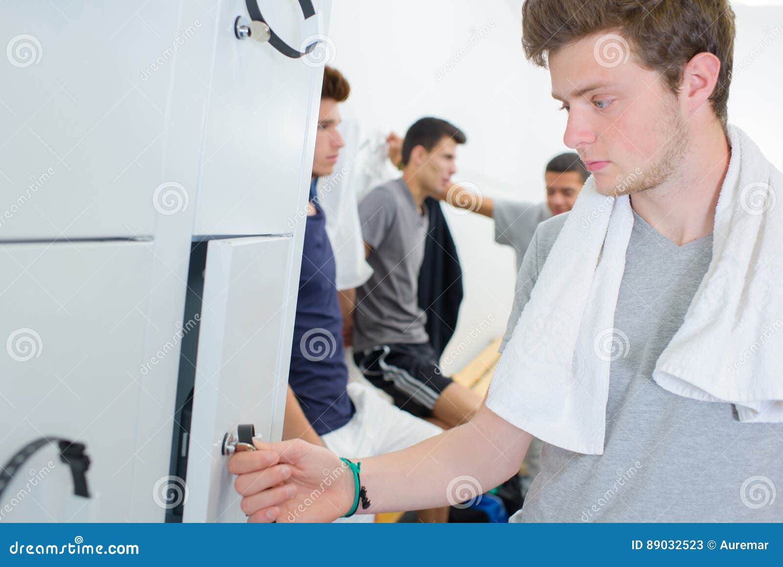 Young man opening locker stock image. Image of misinterpret - 89032523