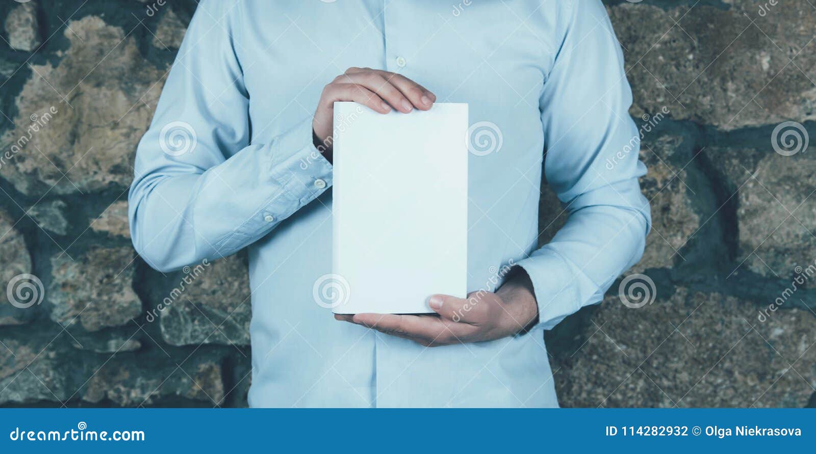 Young Man Opening and Reading a Book. Stock Photo - Image of ...