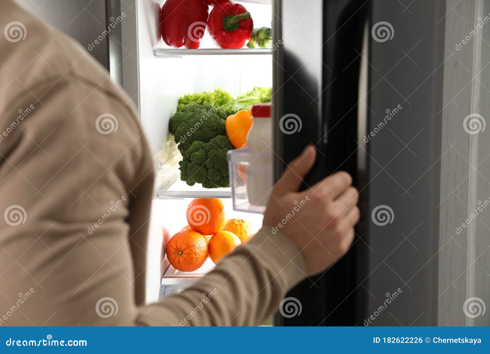 Young Man Opening Refrigerator at Home Stock Photo - Image of cold ...