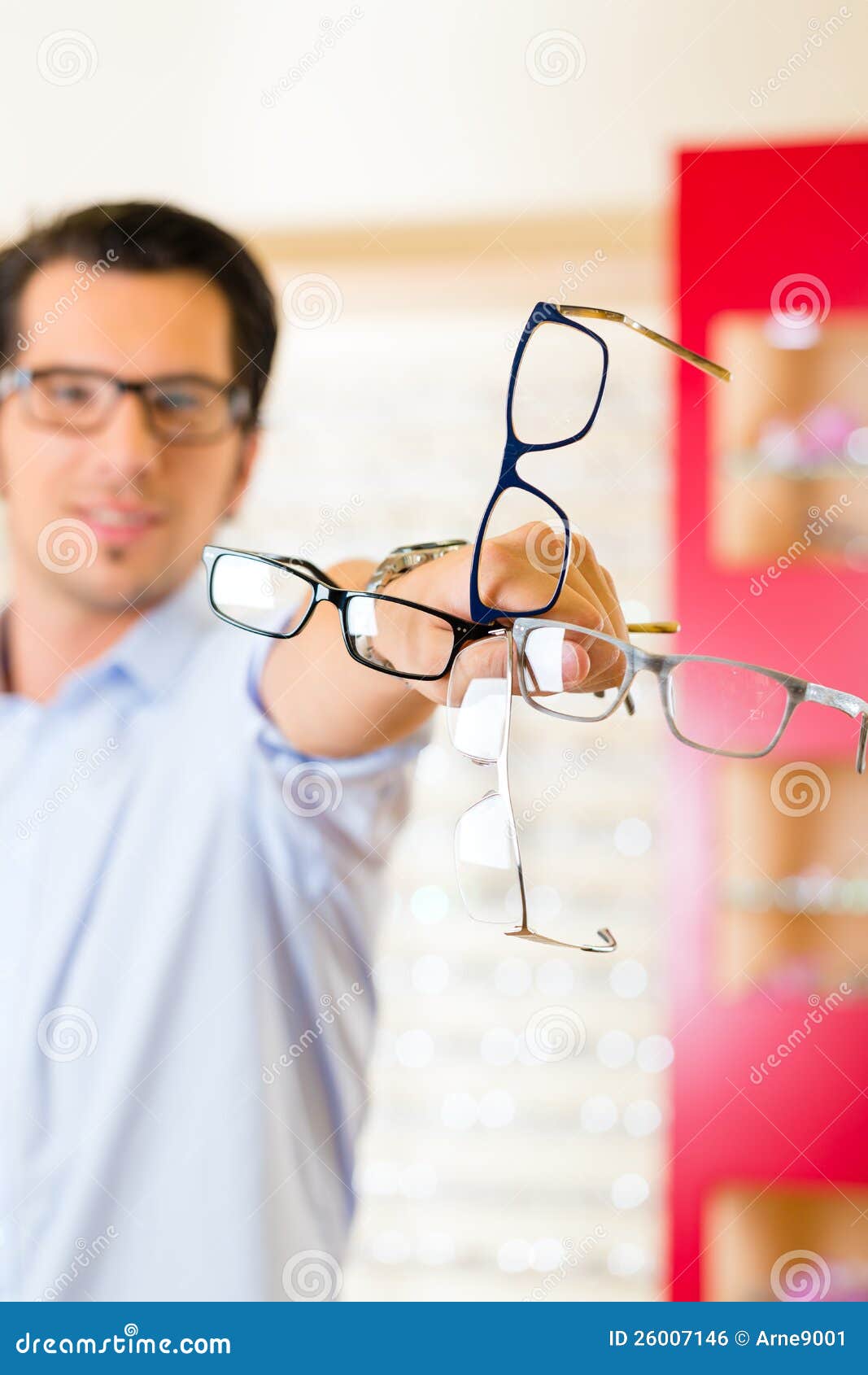 Young Man at Optician with Glasses Stock Photo - Image of modern ...