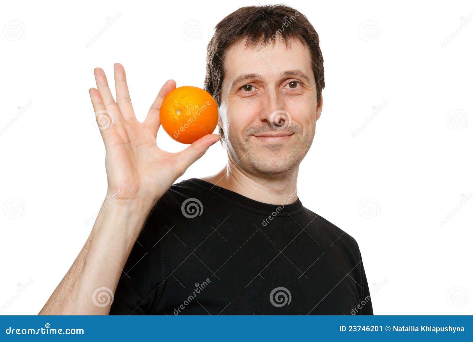 Young man with orange stock image. Image of black, hand - 23746201