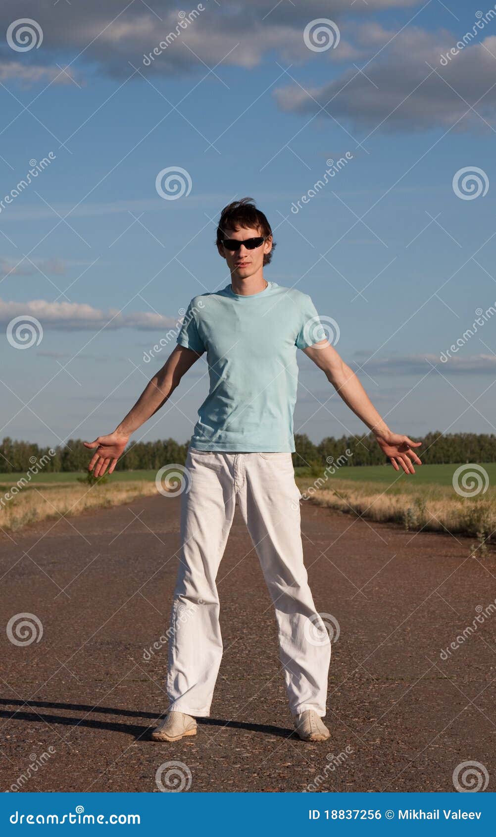 Young man outdoors stock photo. Image of outdoors, road - 18837256