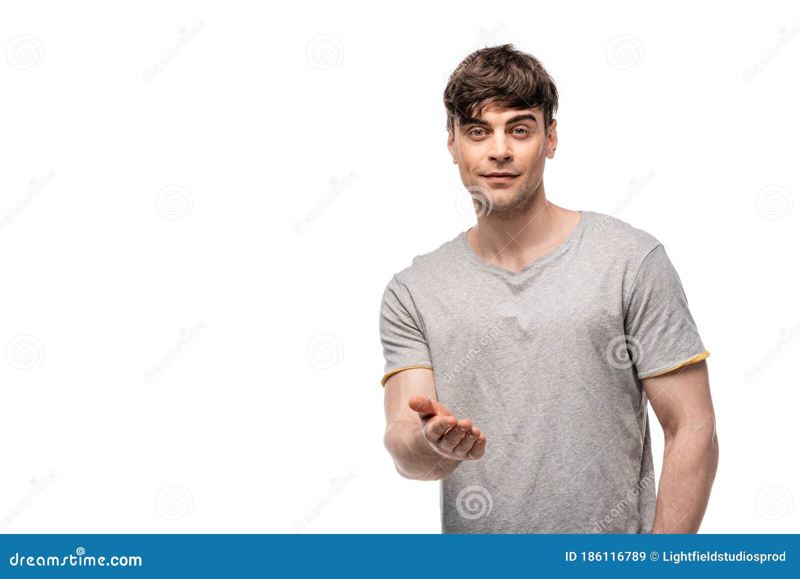 Young Man with Outstretched Hand Looking at Camera Isolated on White ...