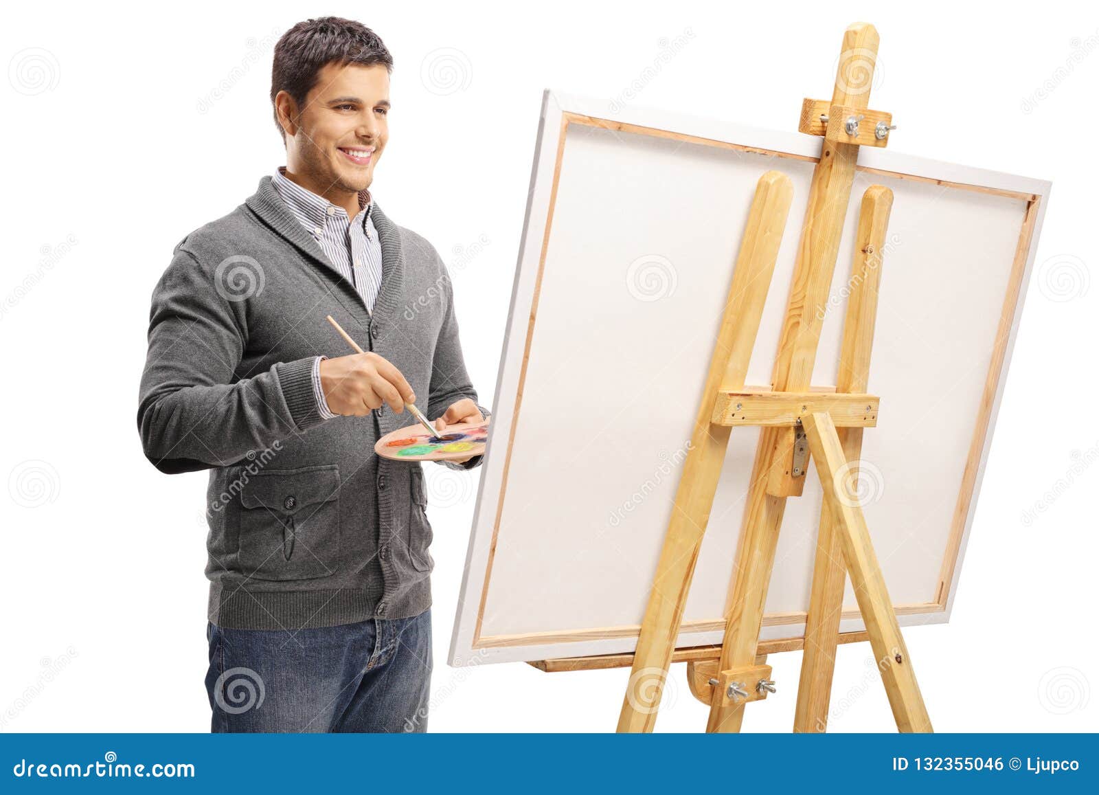 Young Man Painting on a Canvas Stock Photo - Image of isolated ...
