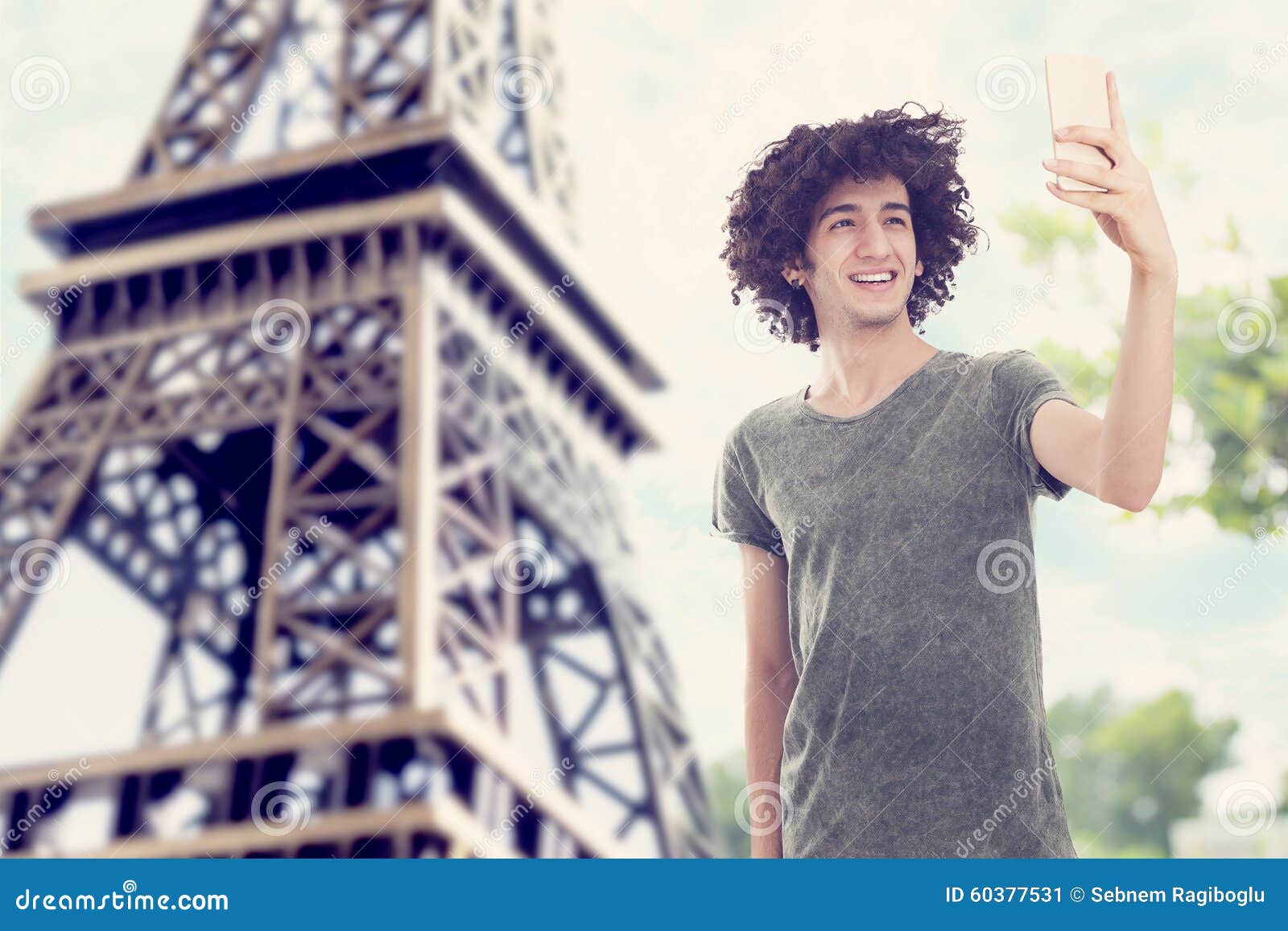 Young man in Paris stock image. Image of phone, person - 60377531