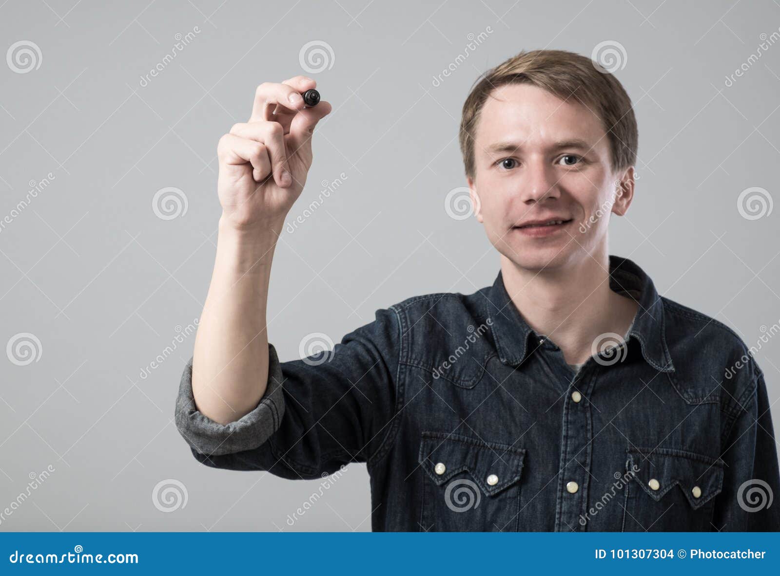 Young man with pen stock photo. Image of looking, person - 101307304