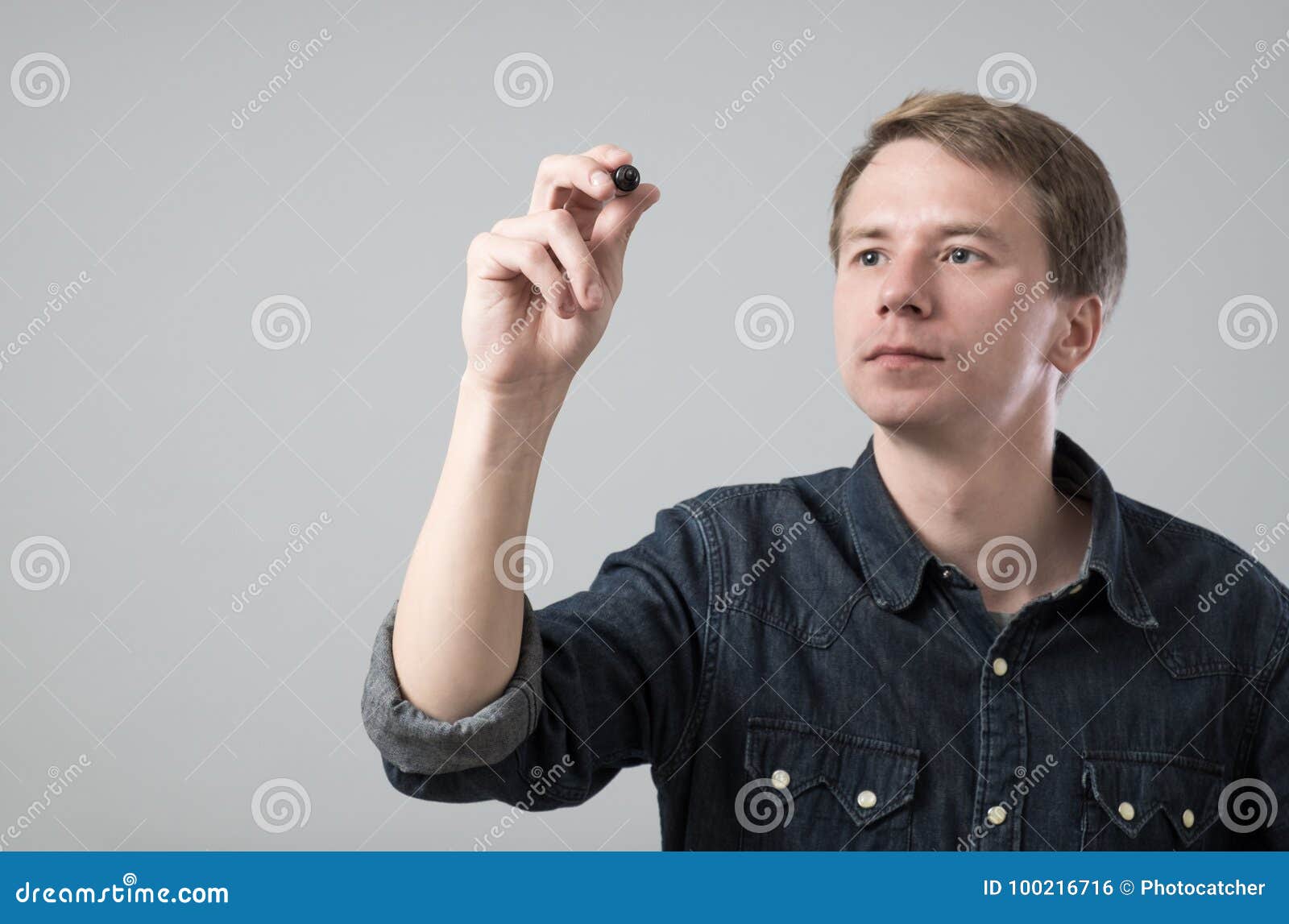 Young man with pen stock photo. Image of looking, empty - 100216716