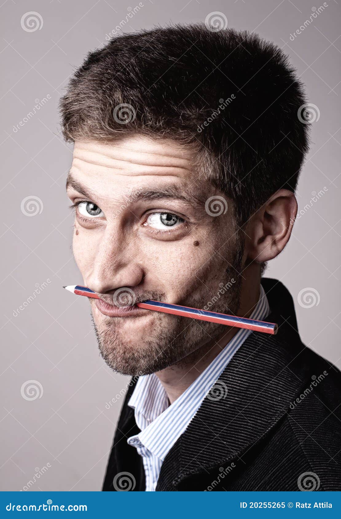 Young man with pencil stock image. Image of executive - 20255265