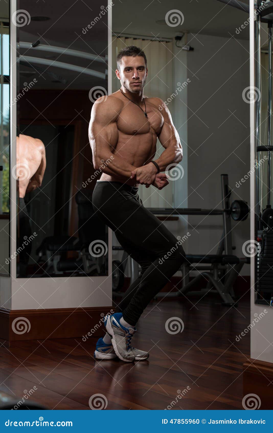 Young Man Performing Side Chest Pose Stock Photo - Image of chest ...