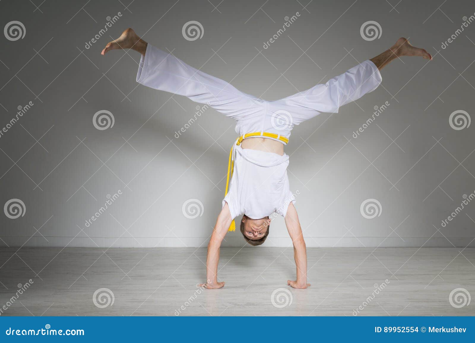 Young Man Performs a Handstand, Capoeira. Stock Photo - Image of ...