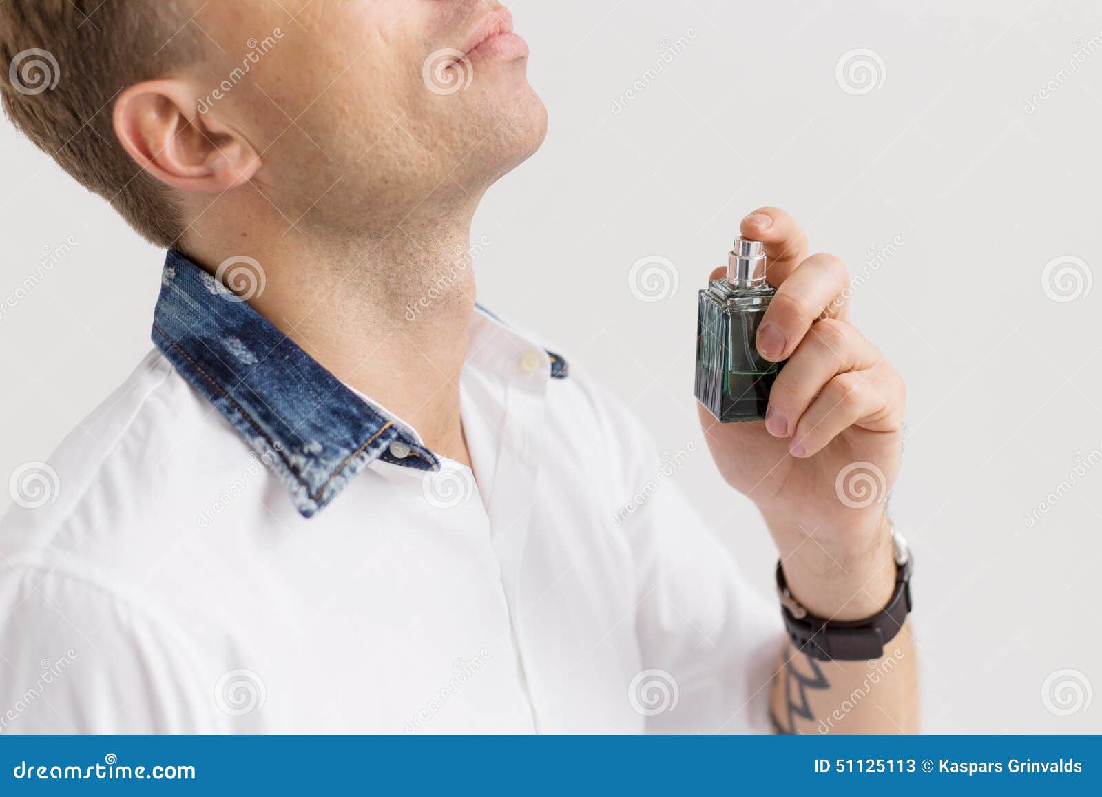 Young Man with Perfume Bottle Stock Image - Image of date, skin: 51125113