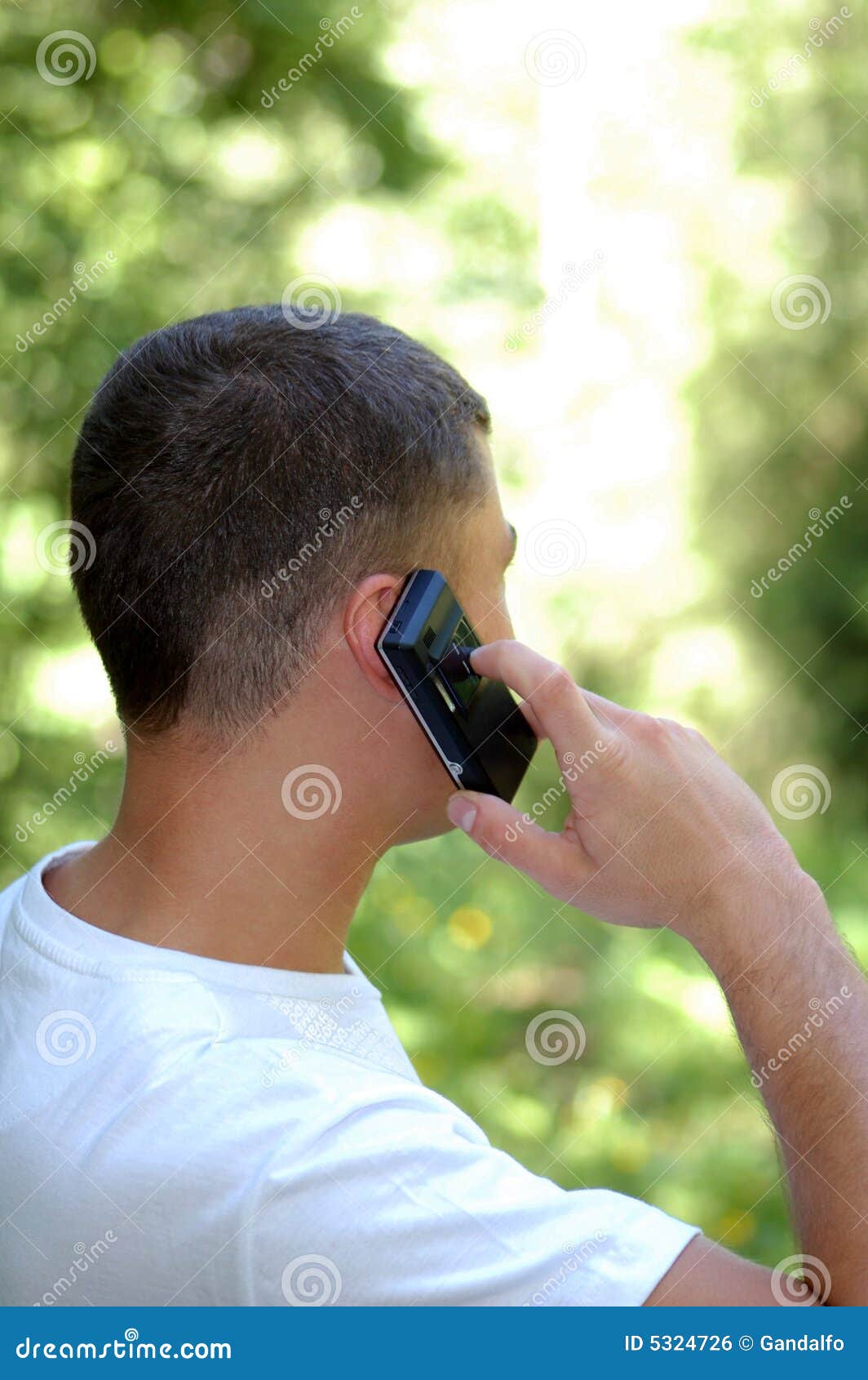 Young man on the phone stock photo. Image of telephone - 5324726