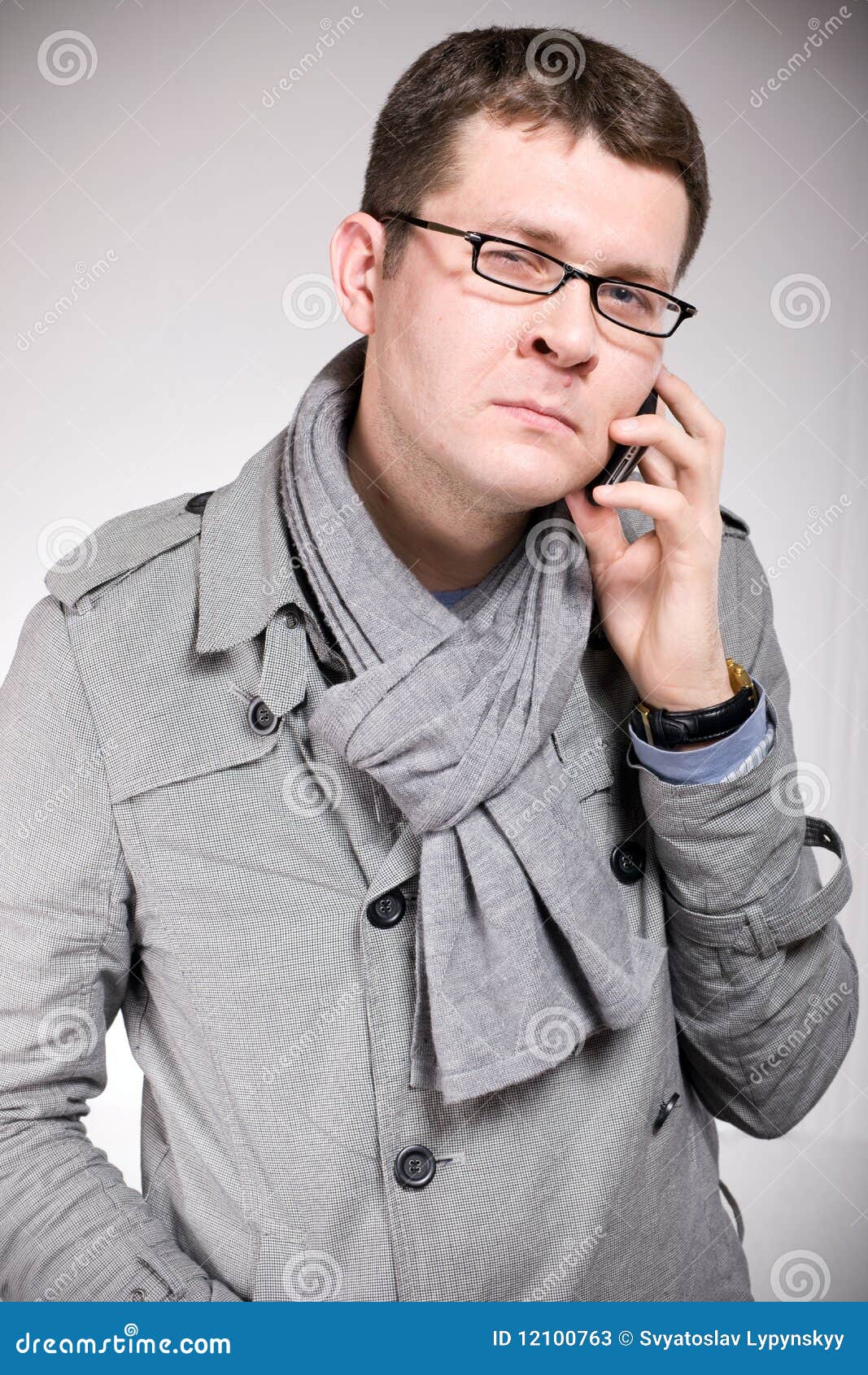Young Man with Phone Take Suspicious Look Stock Image - Image of ...