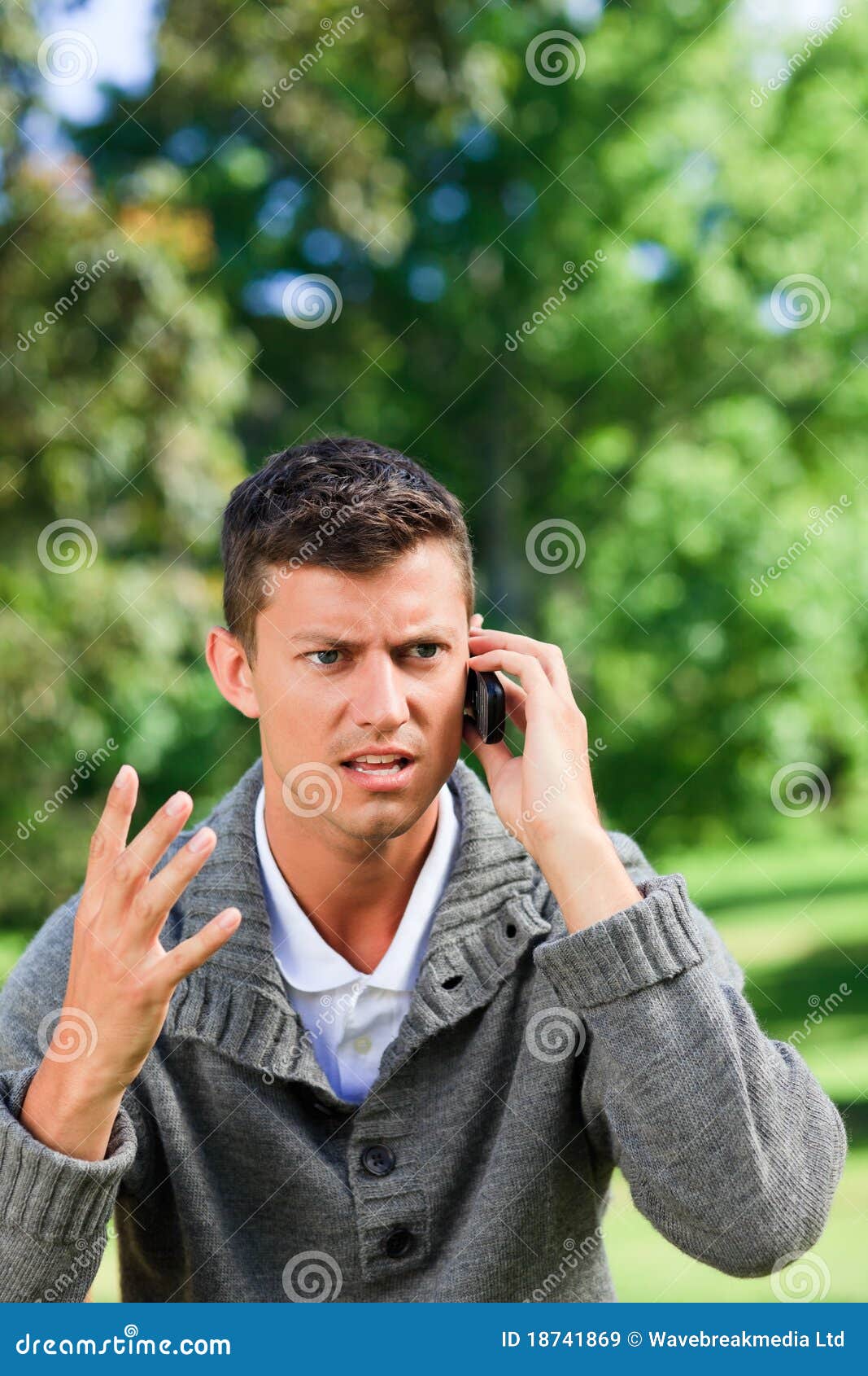 Young man phoning stock image. Image of face, connection - 18741869