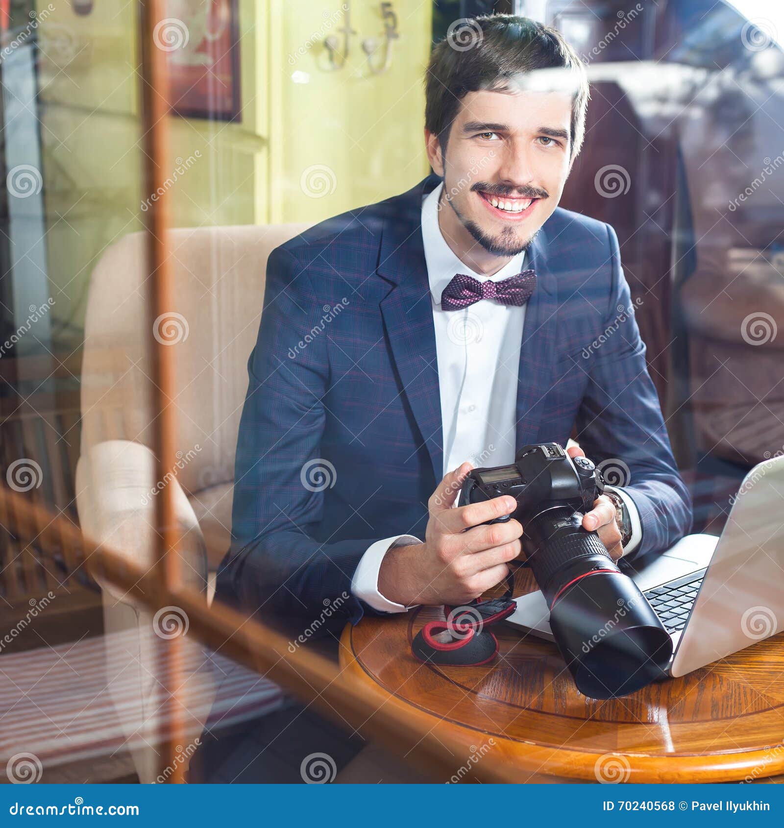 Young Man Photographer Working at Cafe, Using Dslr Camera Stock Photo ...