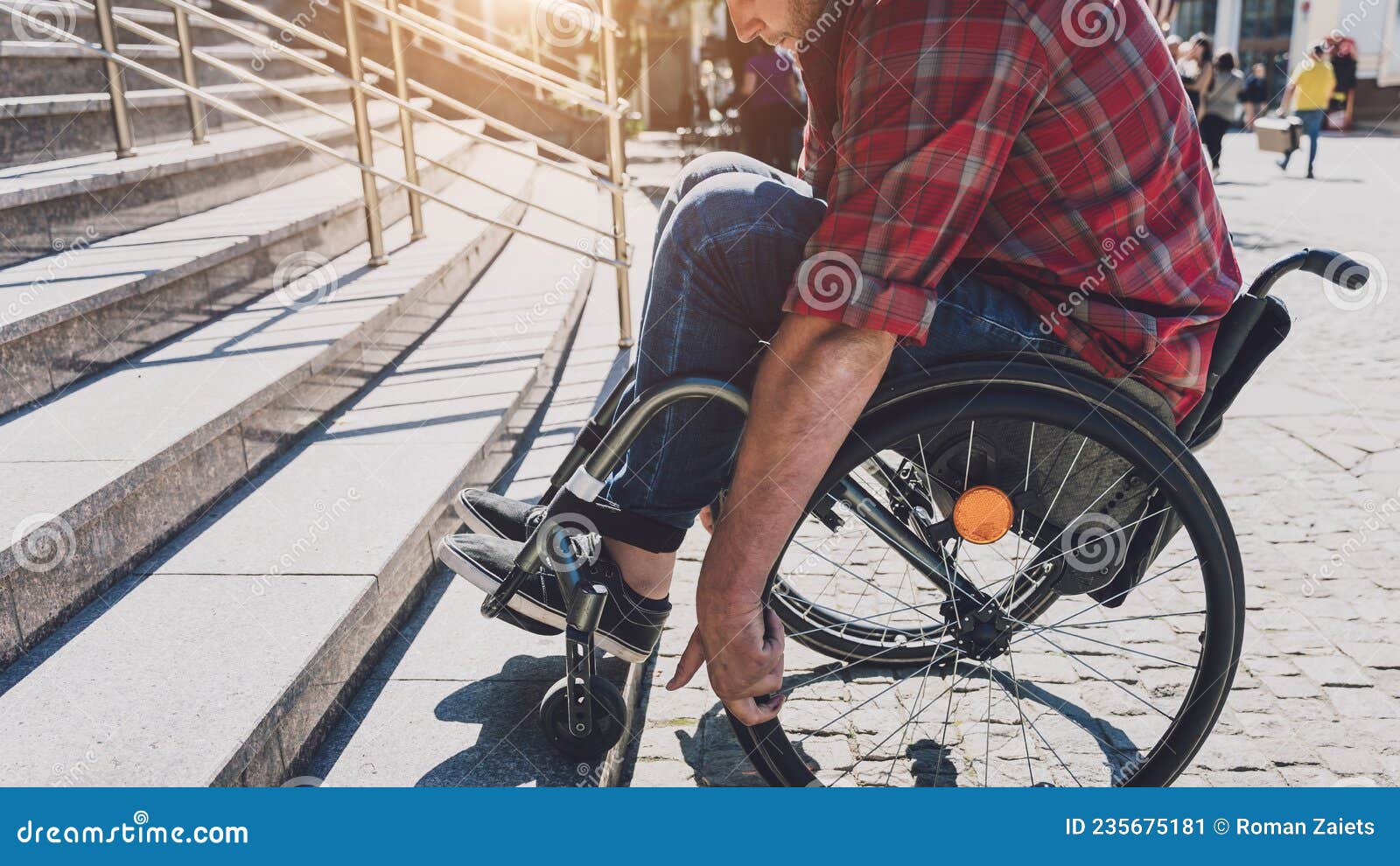 Young Man with a Physical Disability in a Wheelchair in Front of the ...