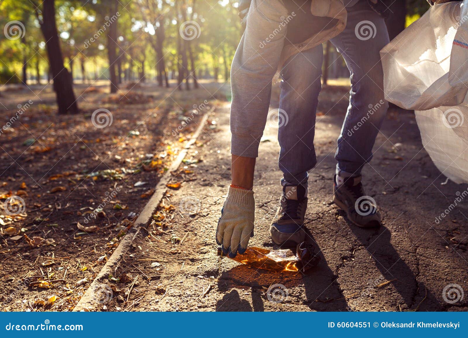 Young Man Picking Up Trash Royalty-Free Stock Photo | CartoonDealer.com ...