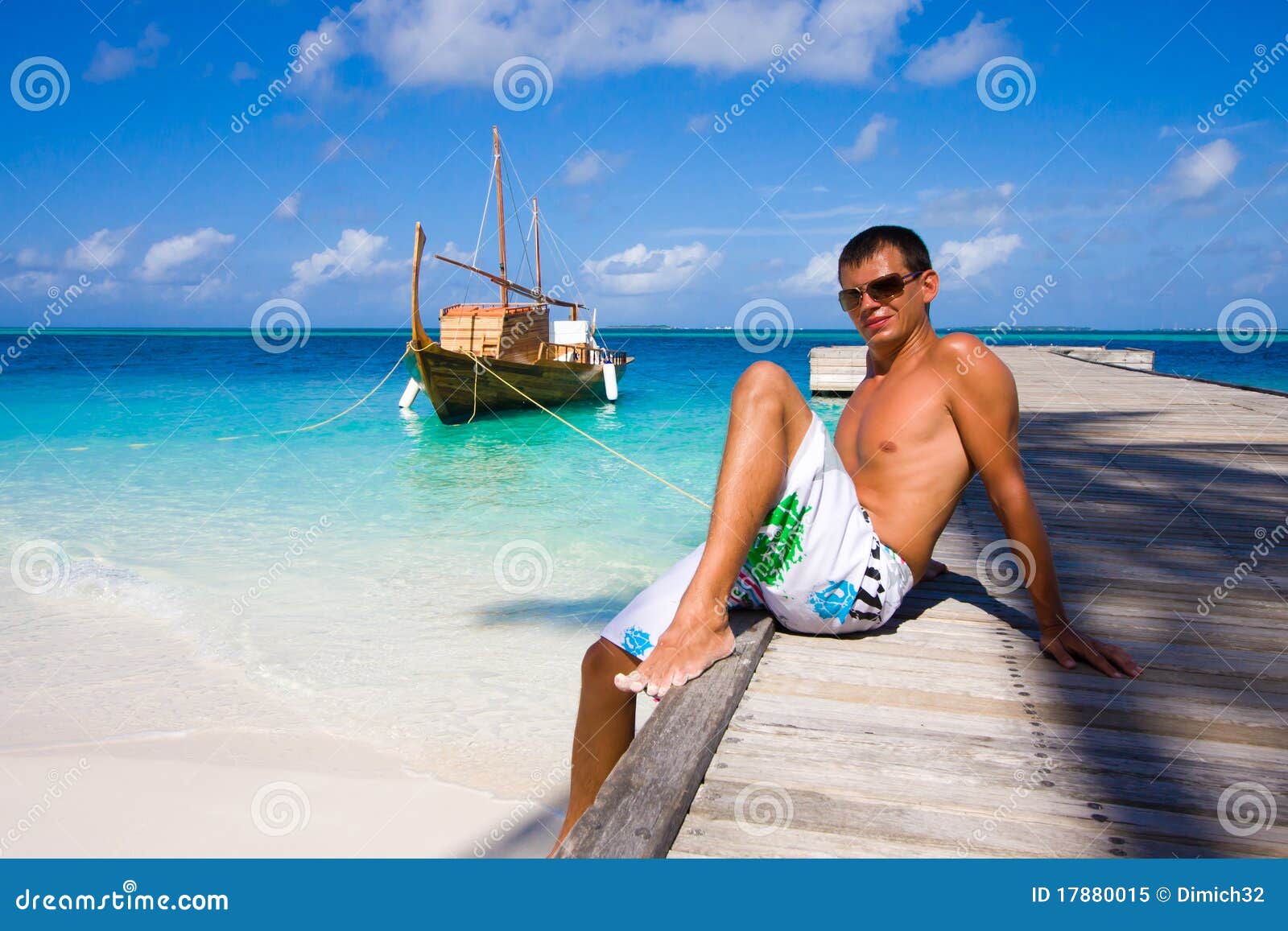Young man on a pier stock image. Image of blue, luxury - 17880015
