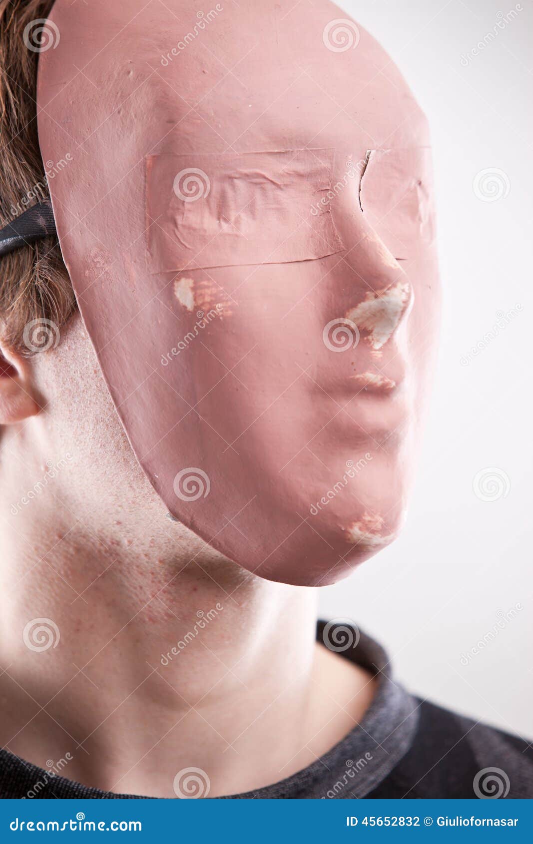 Young man with pink mask stock photo. Image of identity - 45652832