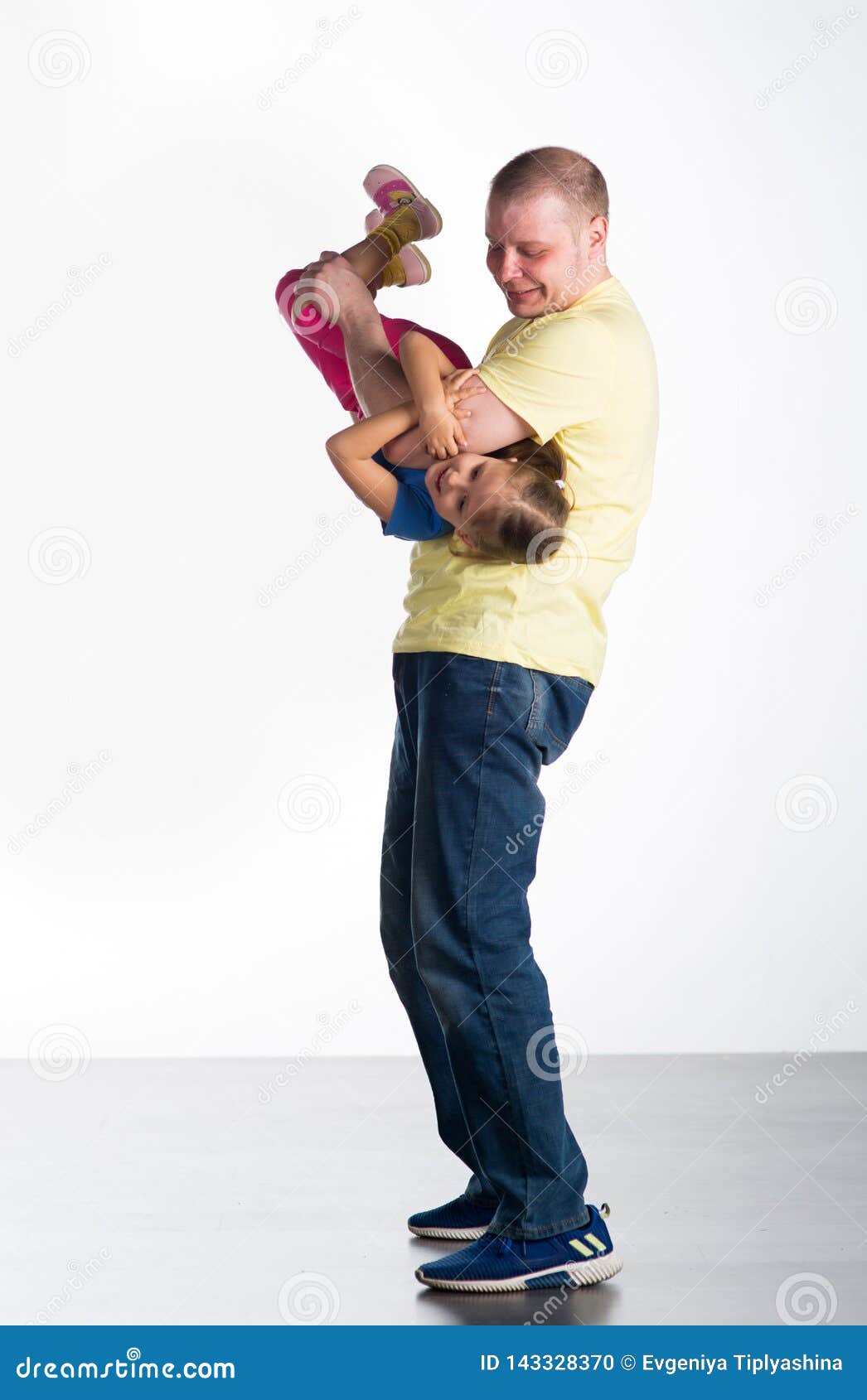Young Man Playing with Baby Stock Photo - Image of beautiful, family ...