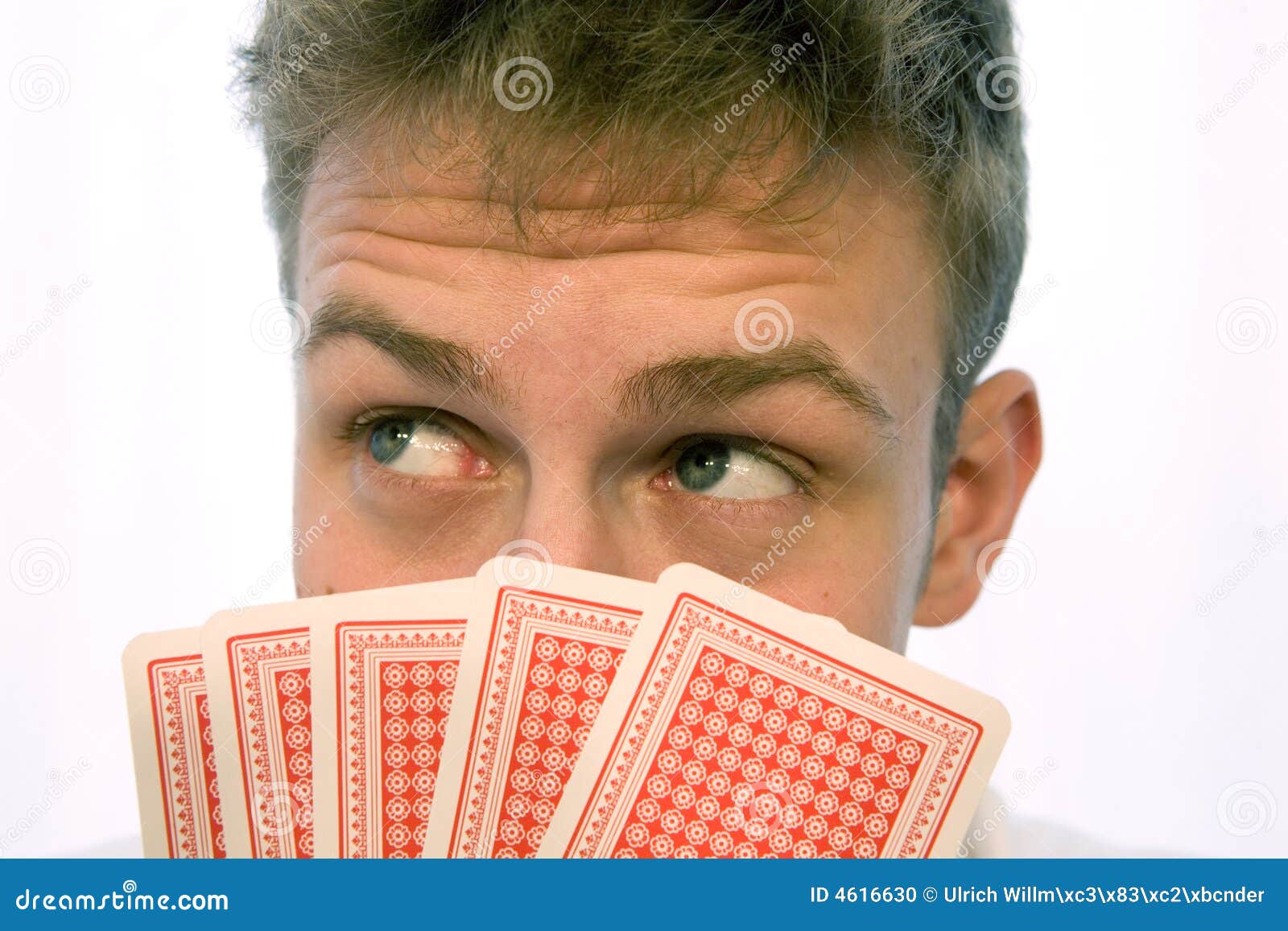 Young man playing cards stock photo. Image of hidden, alone - 4616630