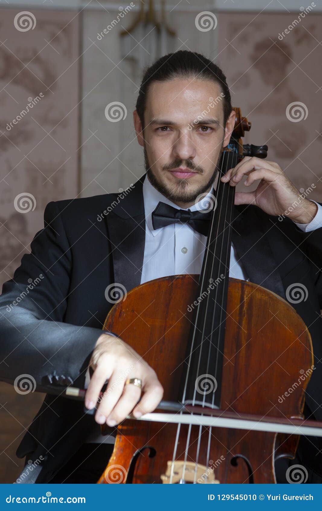 Young Man Playing the Cello. Portrait of the Cellist Stock Photo ...