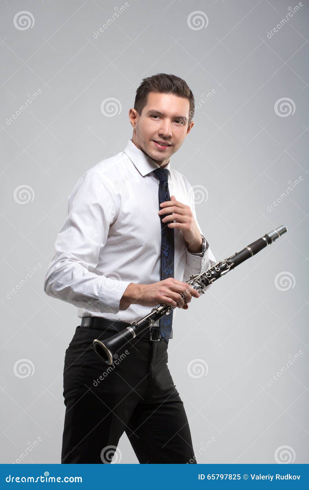 Young Man Playing the Clarinet Stock Image - Image of adult, portrait ...