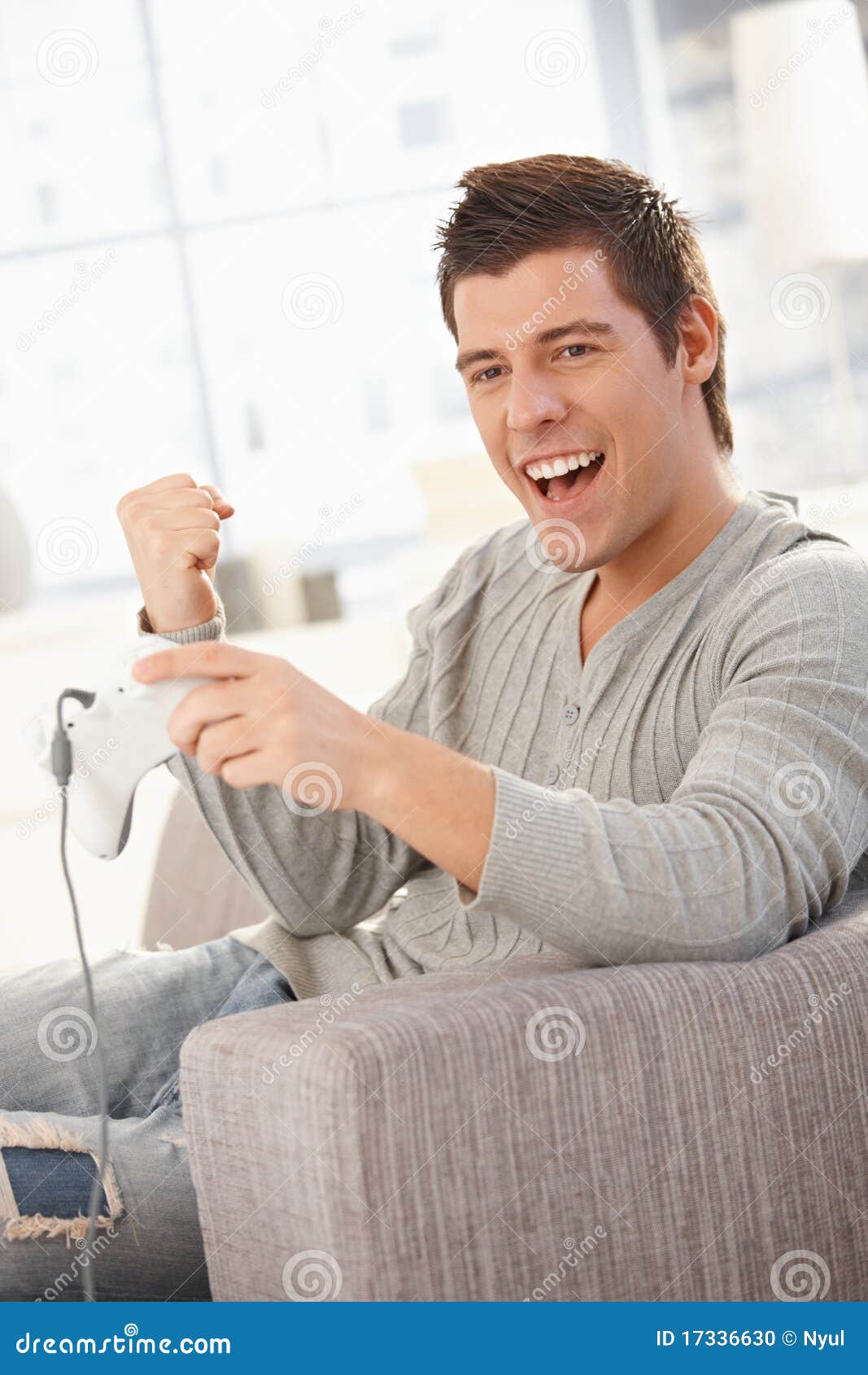 Young Man Playing Computer Game Stock Photo - Image of goodlooking ...