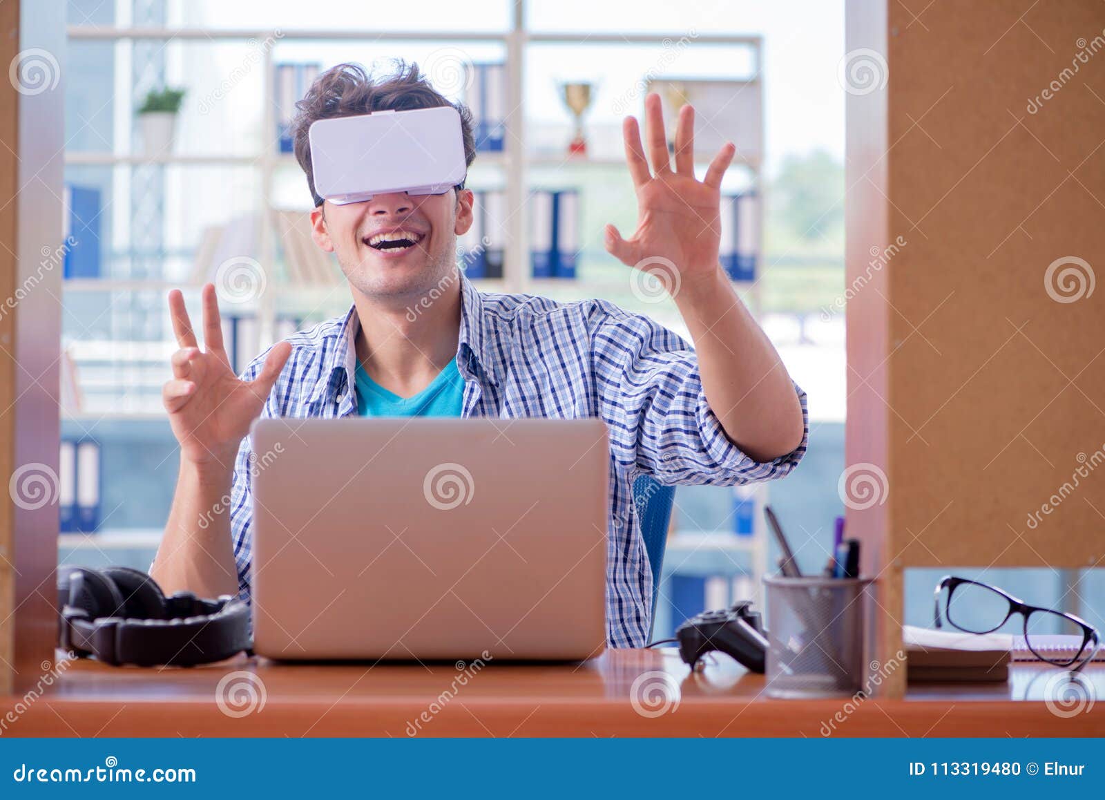 The Young Man Playing Computer Game with Virtual Reality Glasses Stock ...