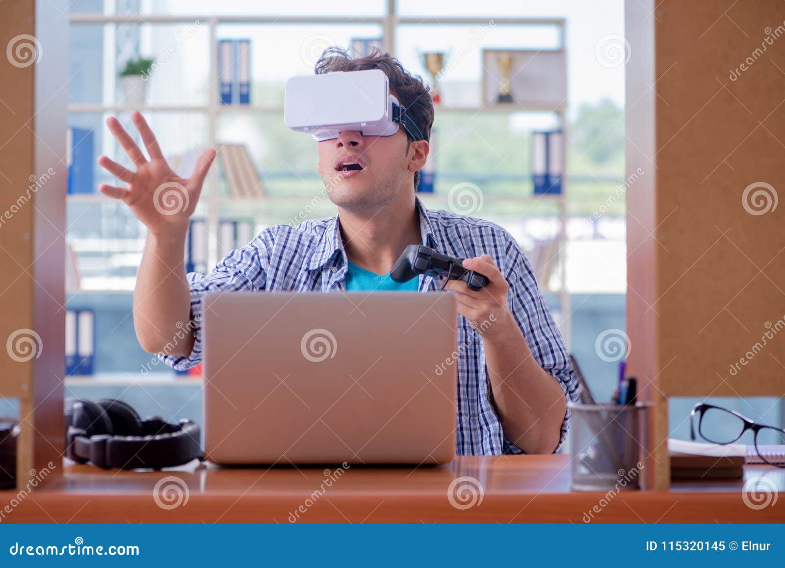 The Young Man Playing Computer Game with Virtual Reality Glasses Stock ...