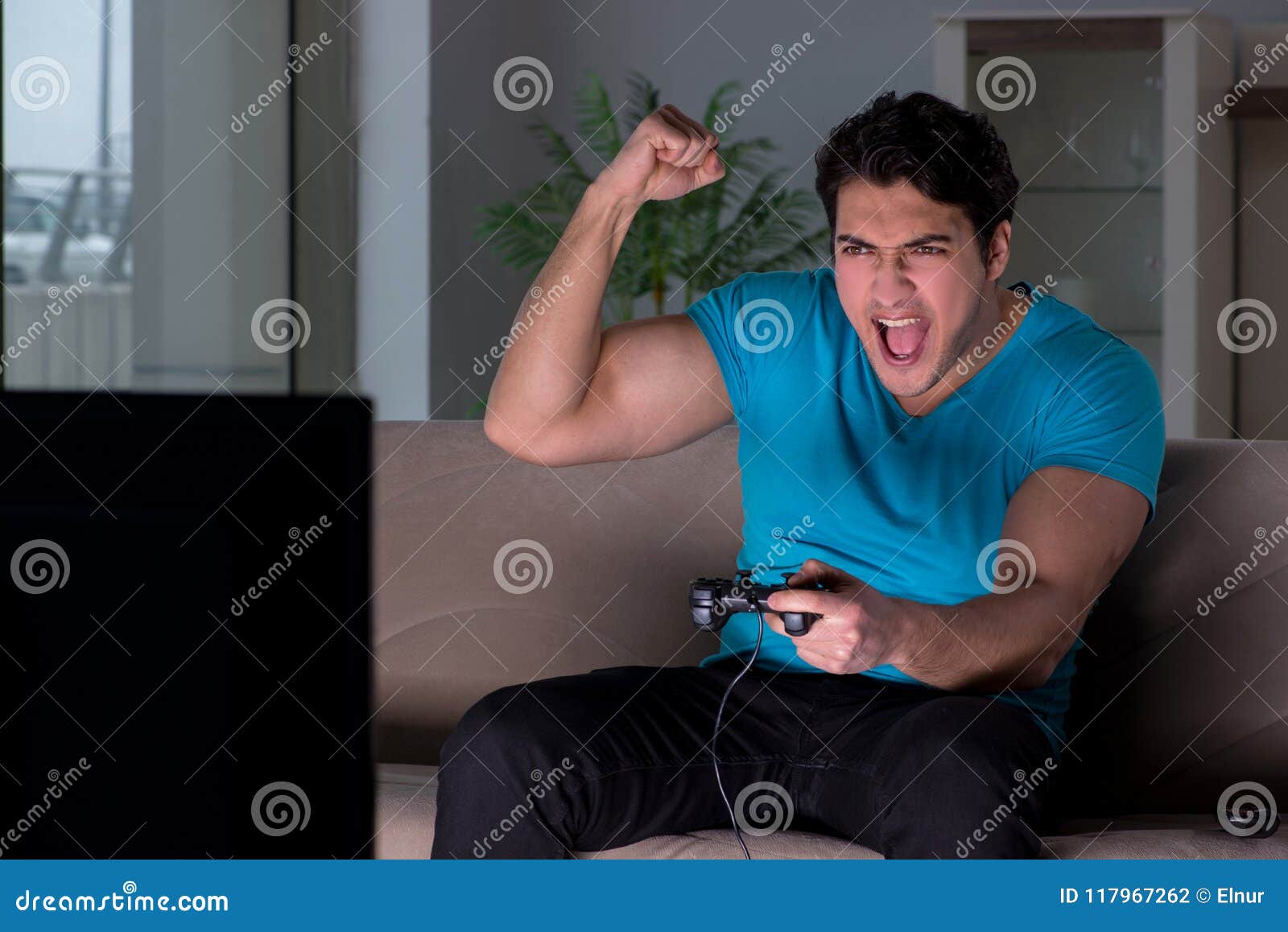 The Young Man Playing Computer Games Late at Night Stock Photo - Image ...