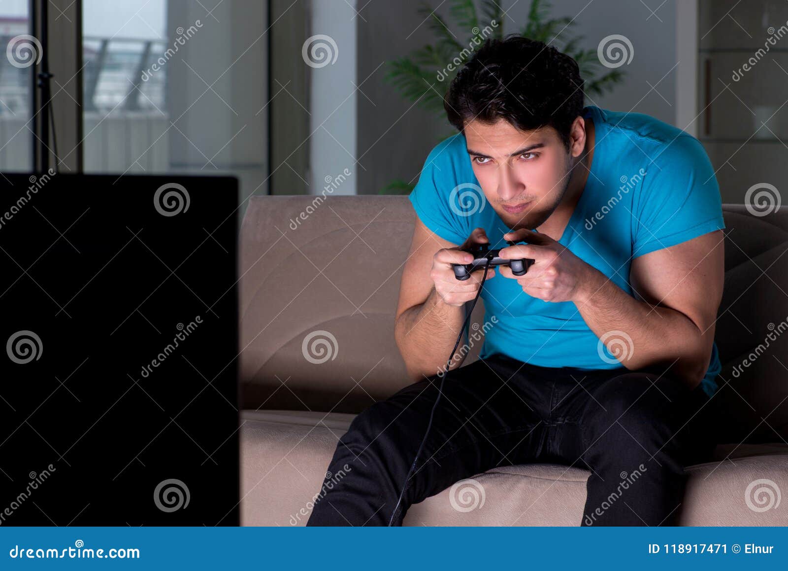 The Young Man Playing Computer Games Late at Night Stock Image - Image ...
