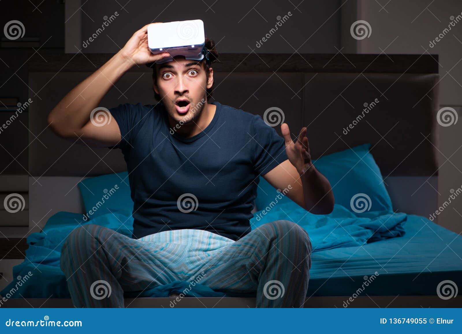 The Young Man Playing Computer Games at Night in Bed Stock Image ...