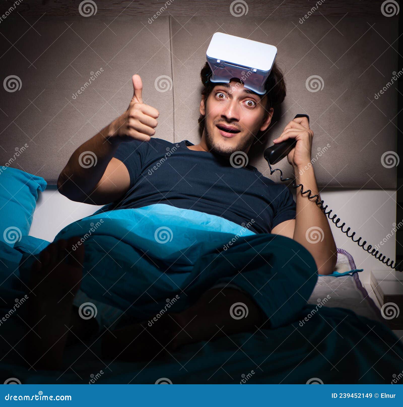 The Young Man Playing Computer Games at Night in Bed Stock Image ...