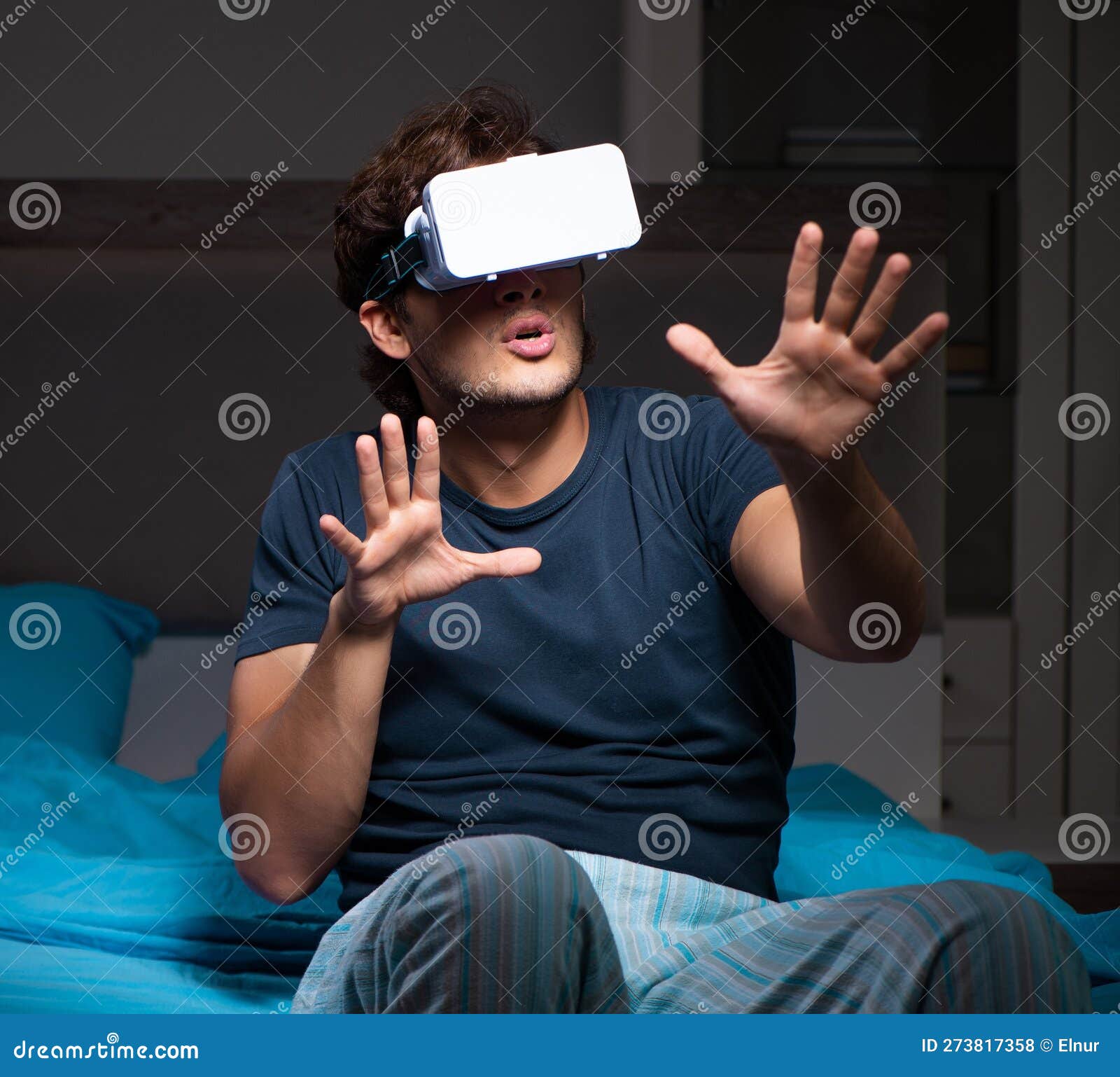 Young Man Playing Computer Games at Night in Bed Stock Photo - Image of ...