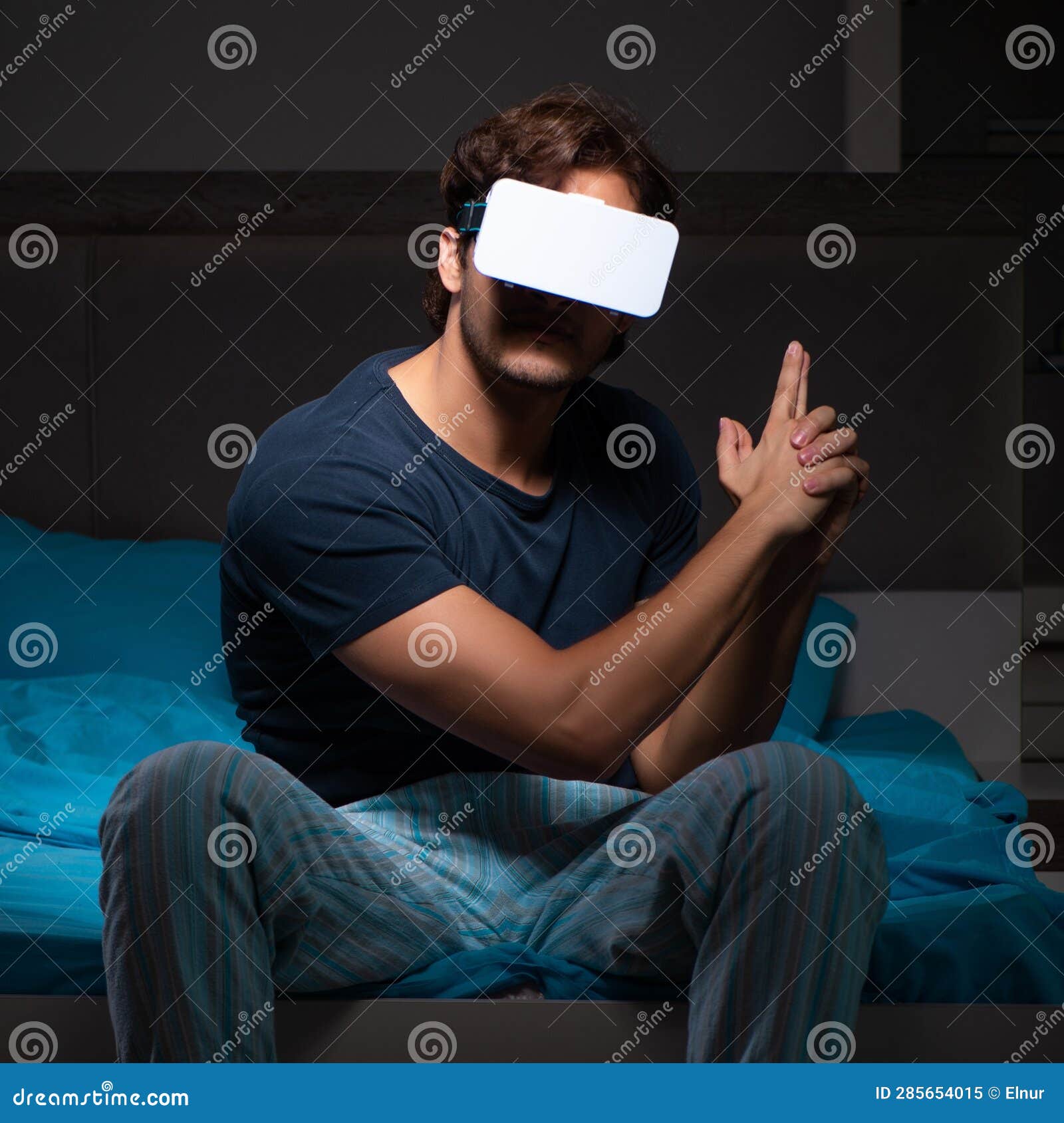 Young Man Playing Computer Games at Night in Bed Stock Image - Image of ...