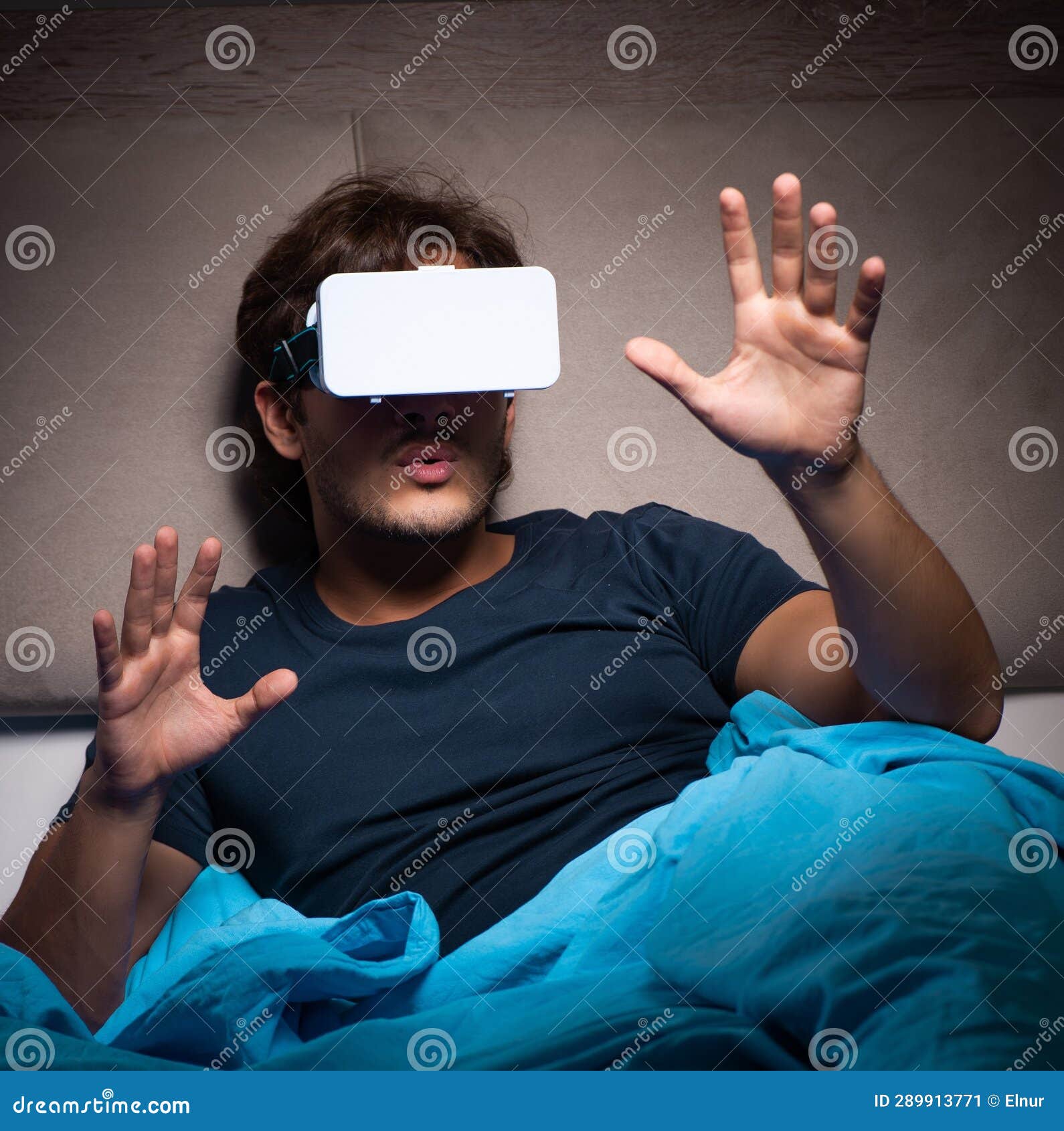 Young Man Playing Computer Games at Night in Bed Stock Image - Image of ...