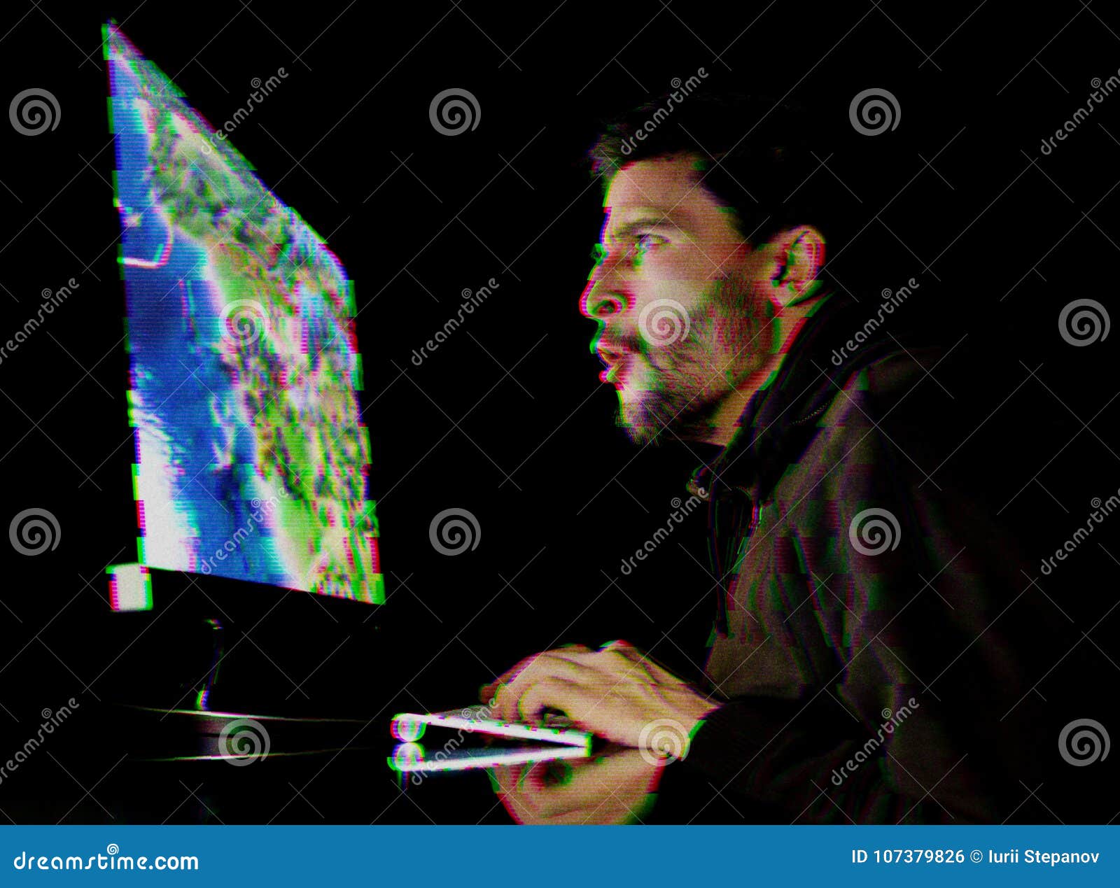 Young Man Playing Computer Game. Glitch Effect Added Stock Photo ...